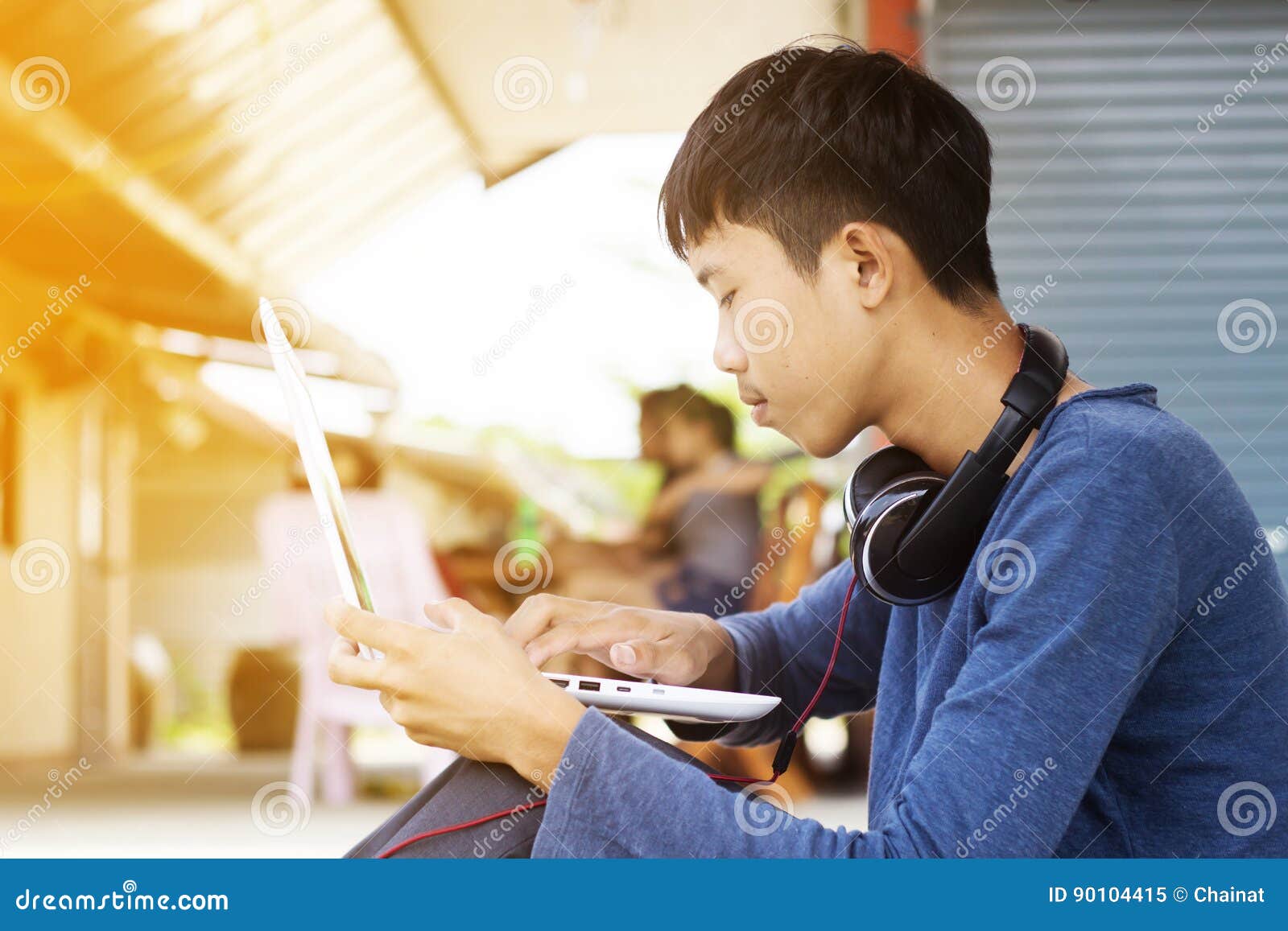 Teenager using laptop stock image. Image of internet - 90104415