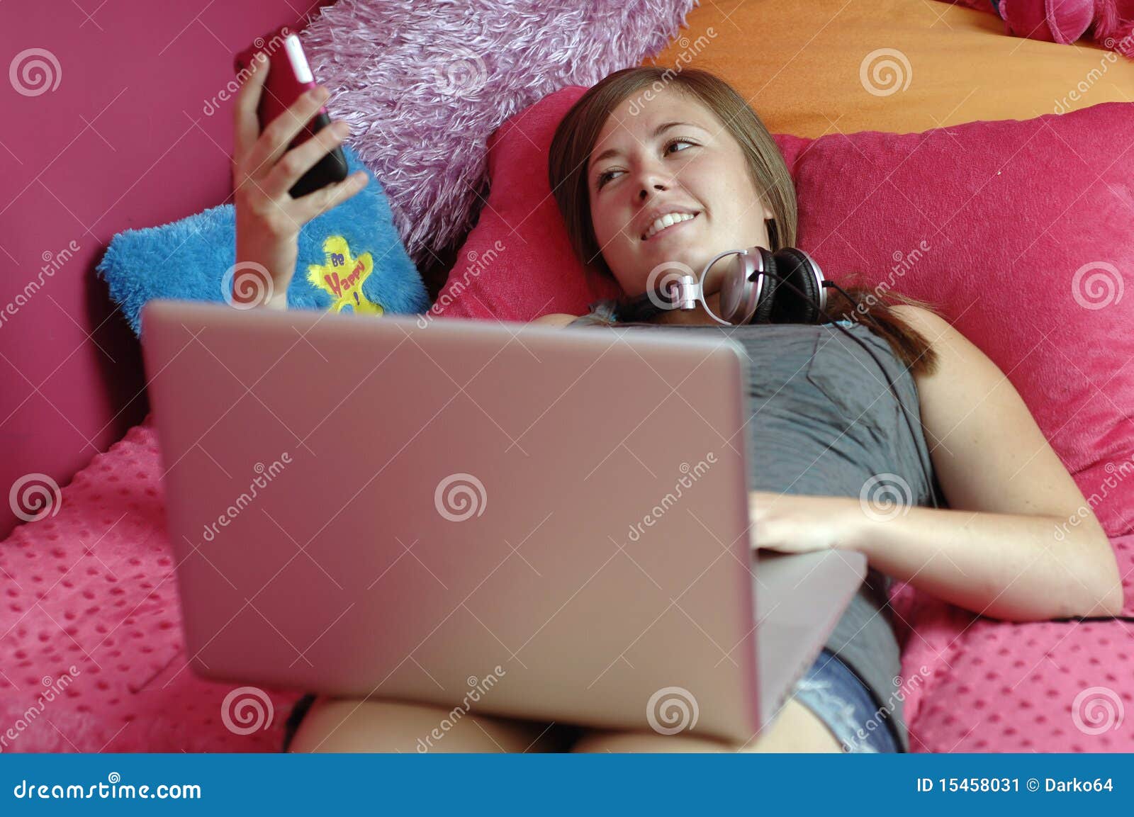 Teenager Using Mobile Phone and Computer Stock Image - Image of network ...