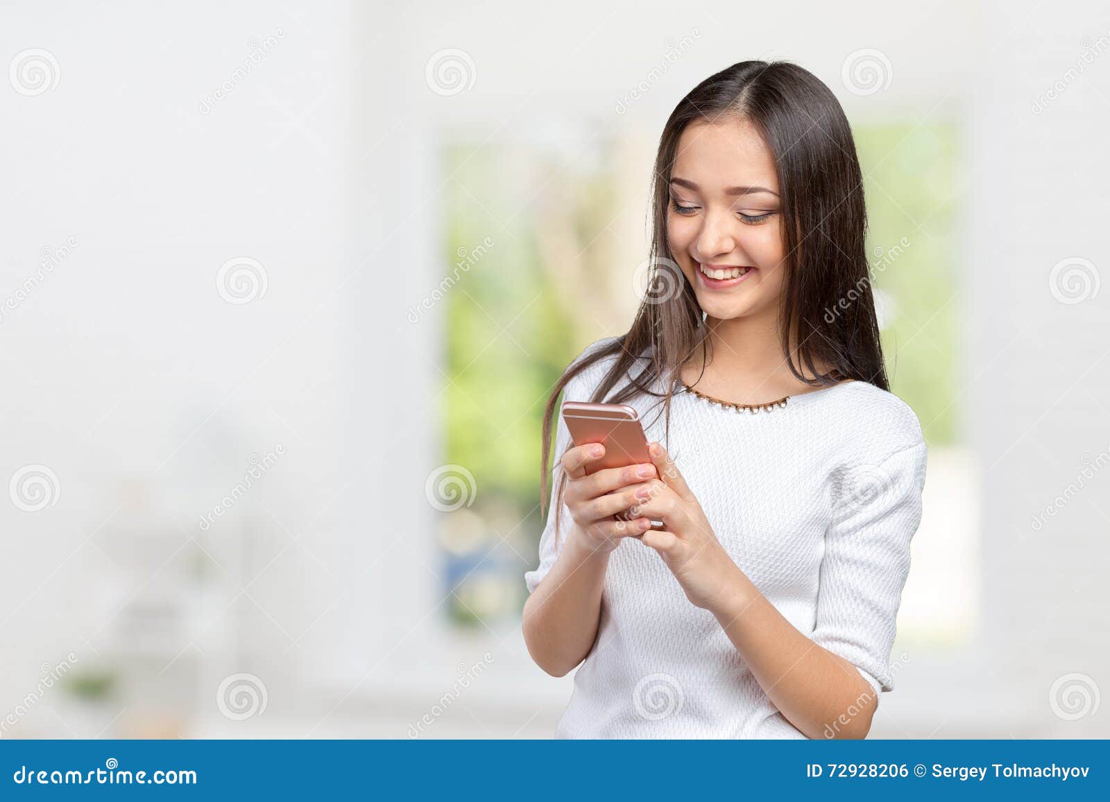 Teenager using smartphone stock photo. Image of beautiful - 72928206