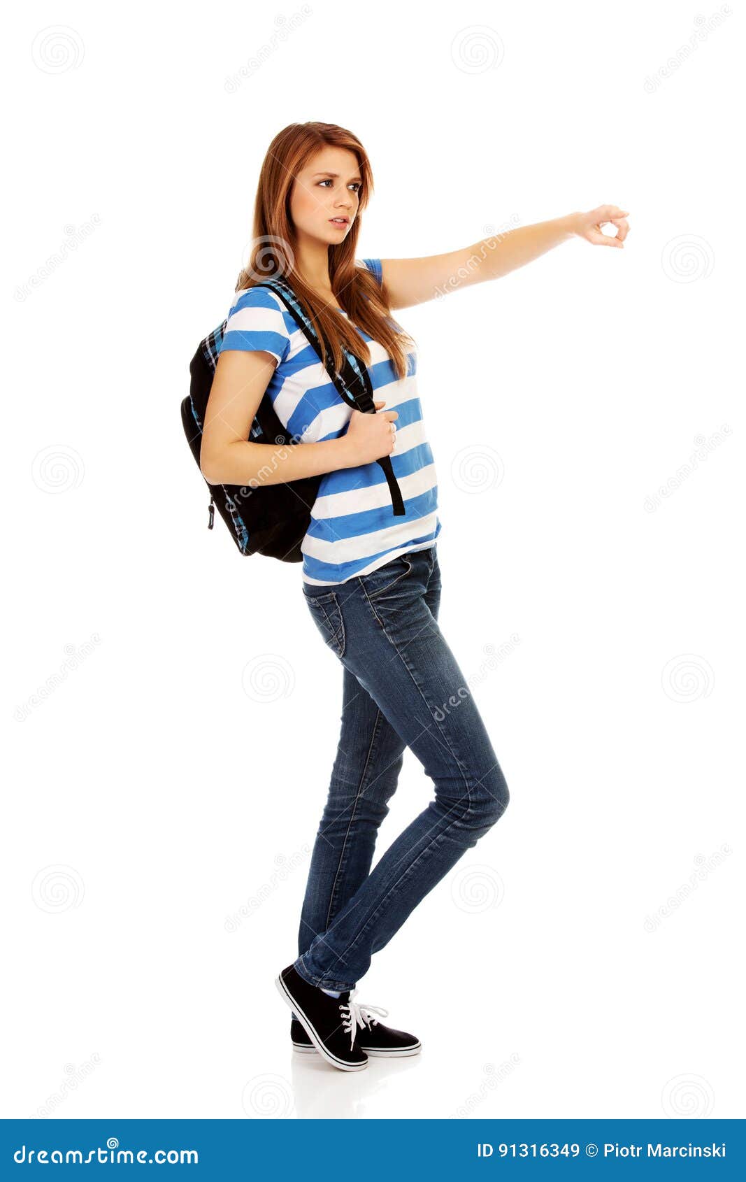 Teenager Woman with Backpack Pointing for Soomething Stock Image ...