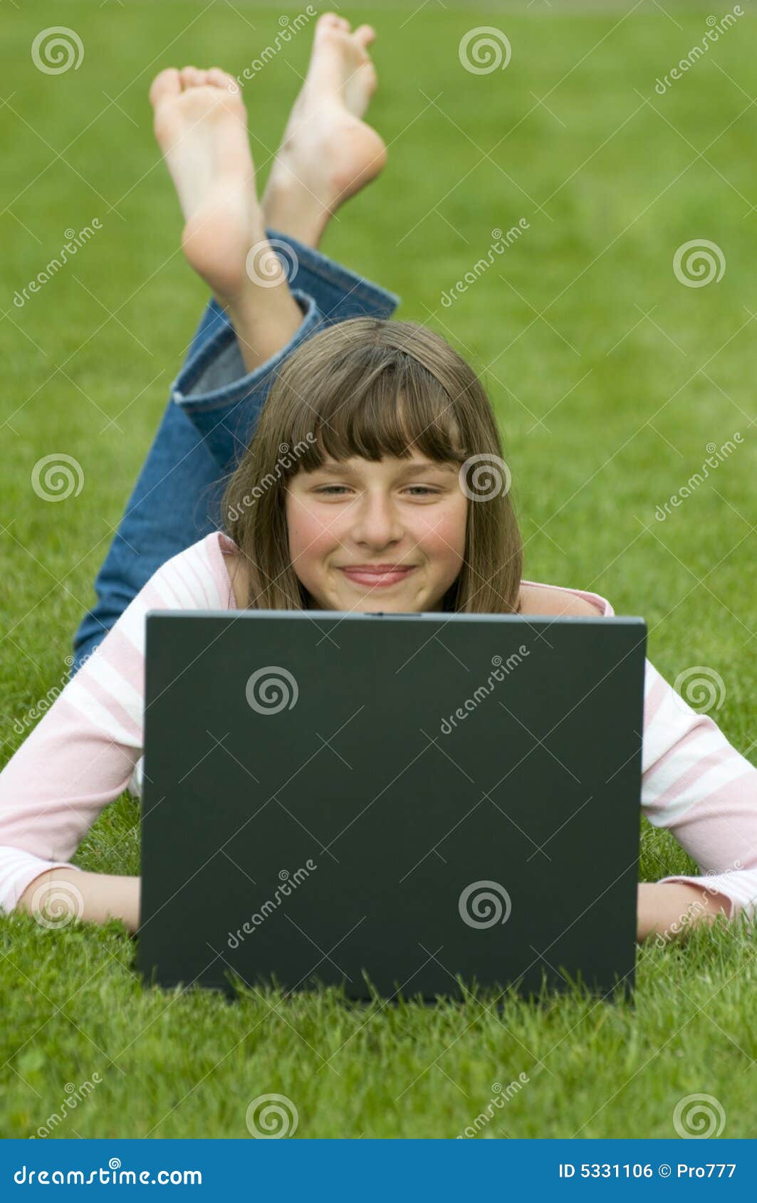 Teenager Working at Computer on the Grass Stock Photo - Image of laptop ...