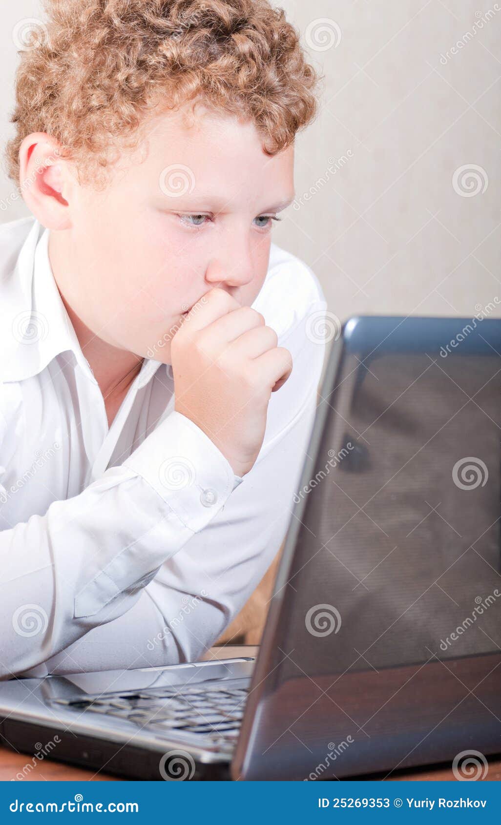 A Teenager Working for a Laptop Stock Image - Image of looking ...