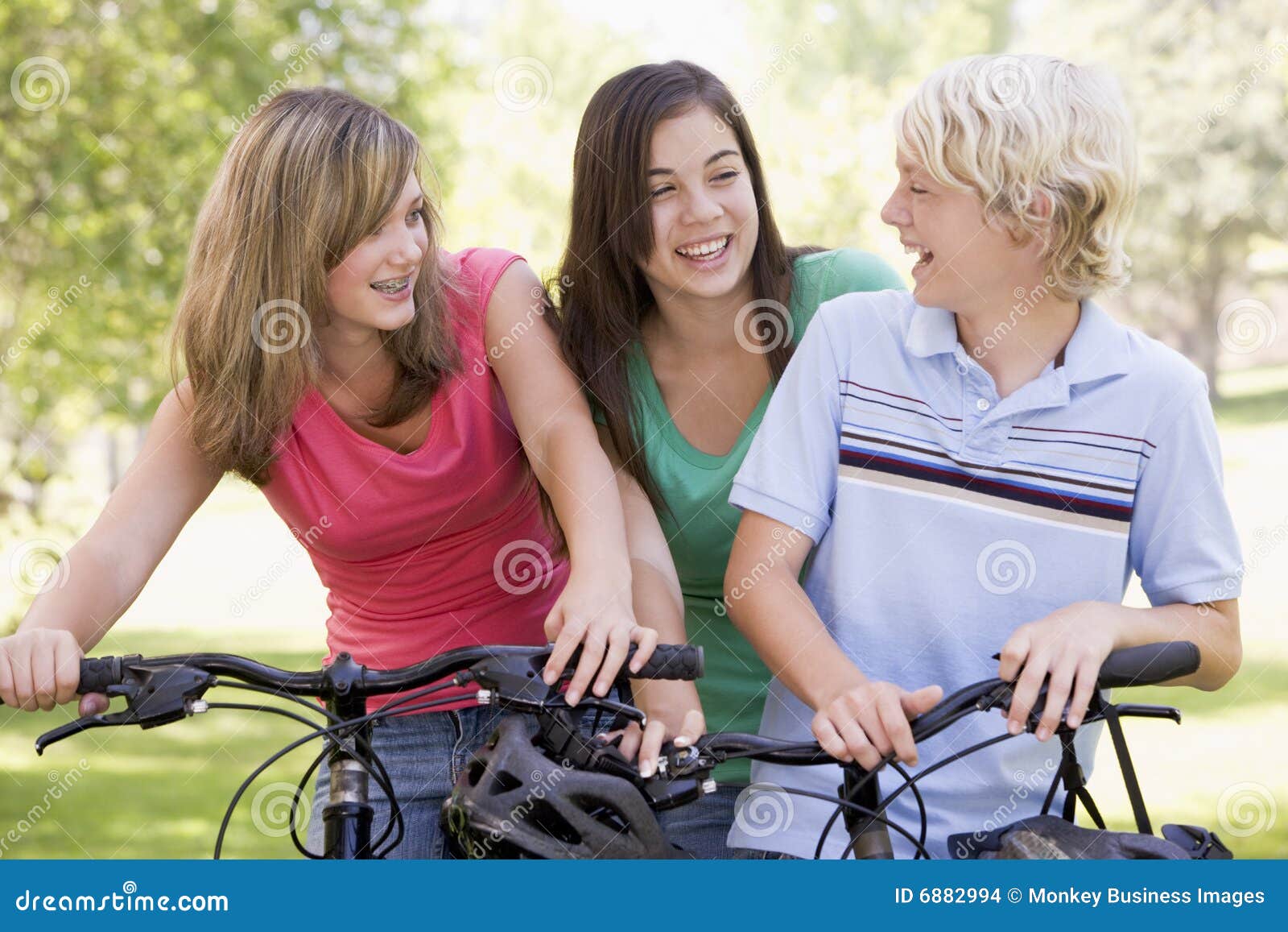 Teenagers on Bicycles stock photo. Image of friendship - 6882994