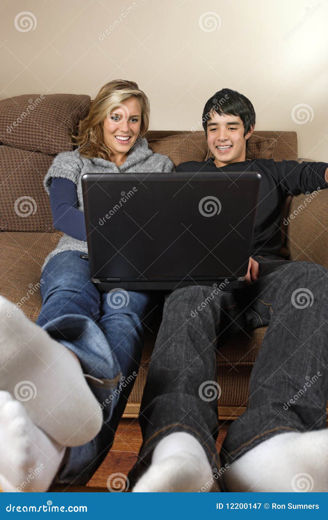 Teenagers Browsing Internet Stock Image - Image of home, internet: 12200147