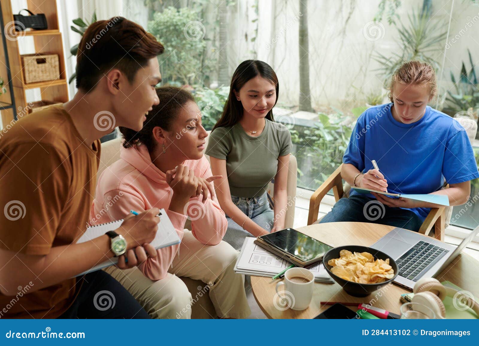 Teenagers Discussing Ideas stock photo. Image of computer - 284413102