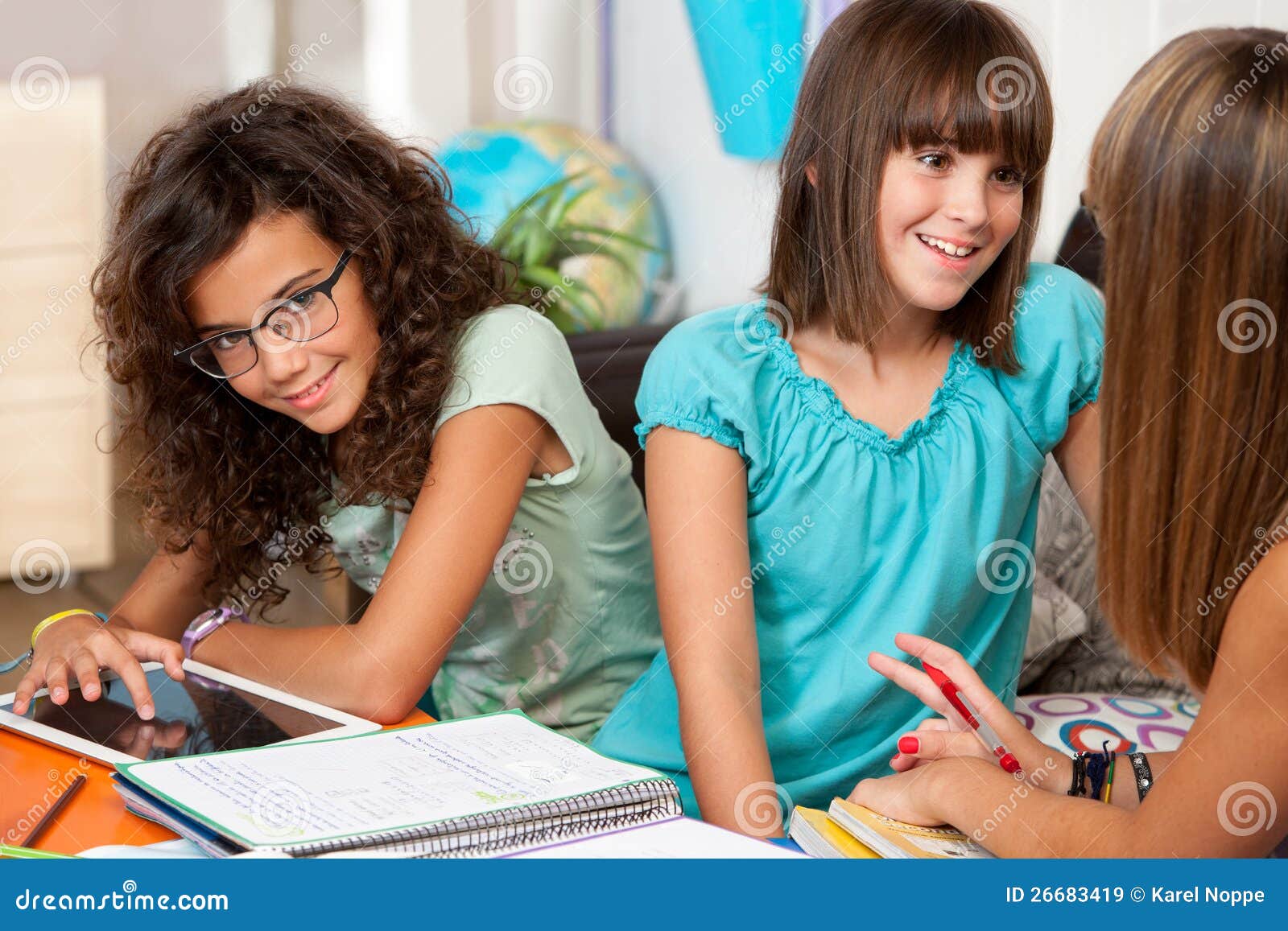 Teenagers Discussing Their Homework. Stock Image - Image of portrait ...