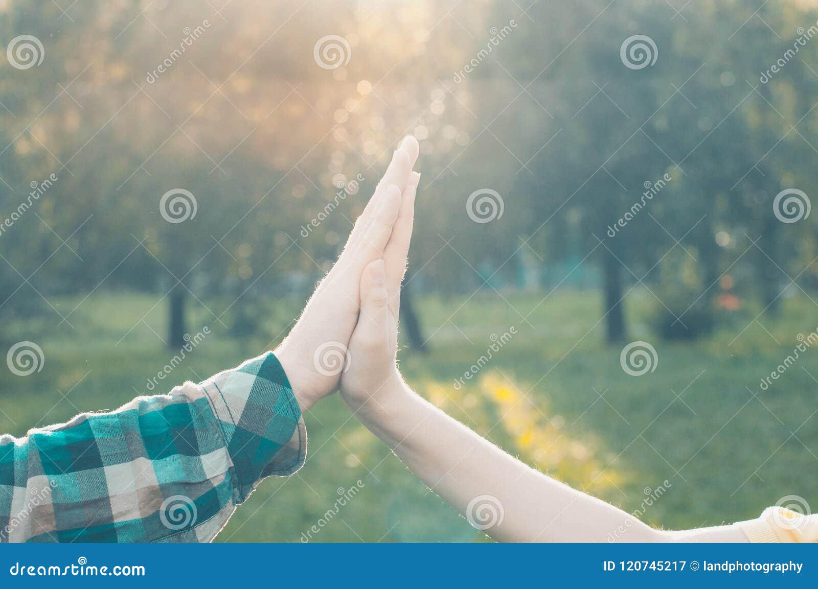 Teenagers hands high five stock image. Image of cheerful - 120745217
