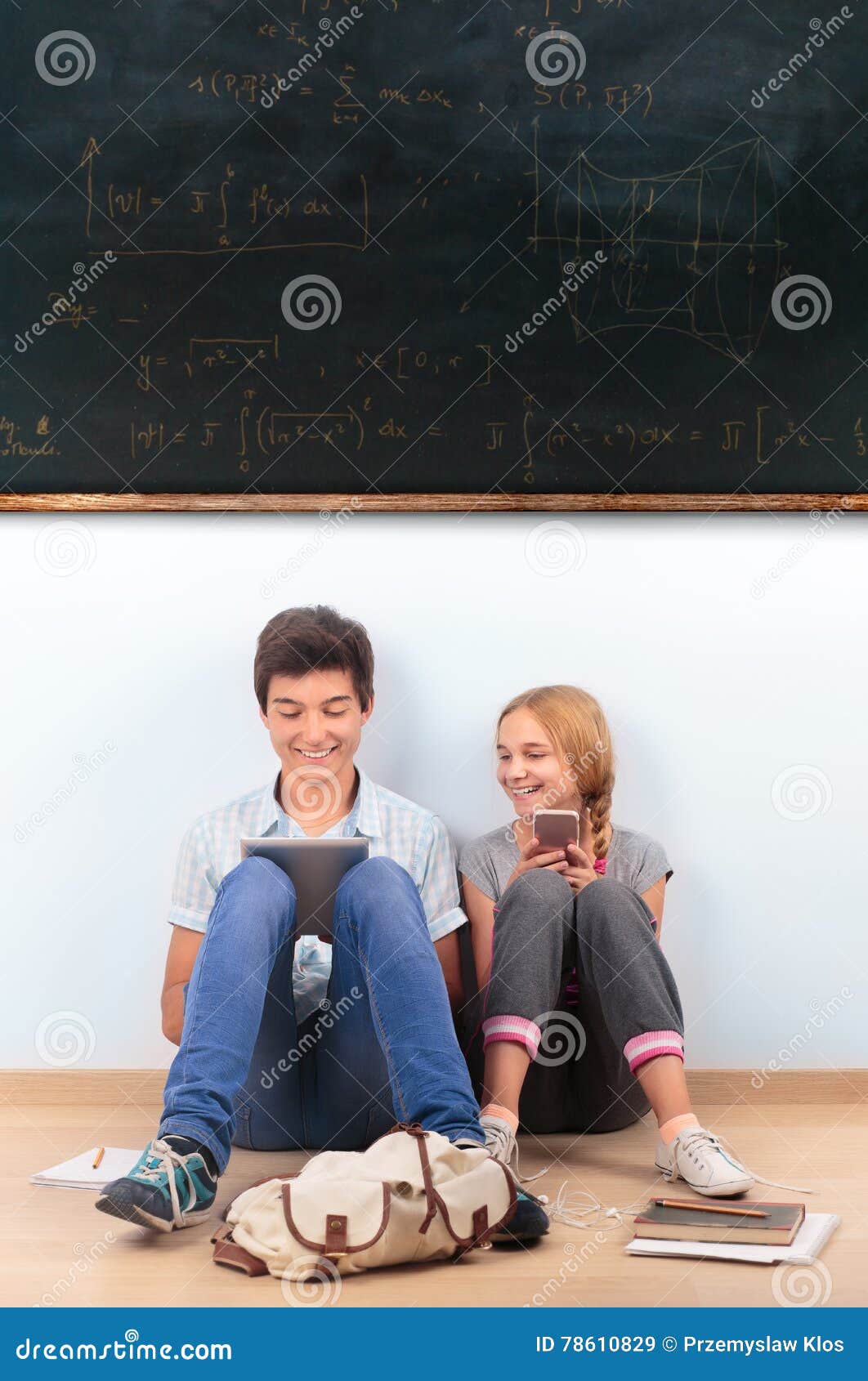 Teenagers Learning by a Blackboard in Classroom Stock Image - Image of ...