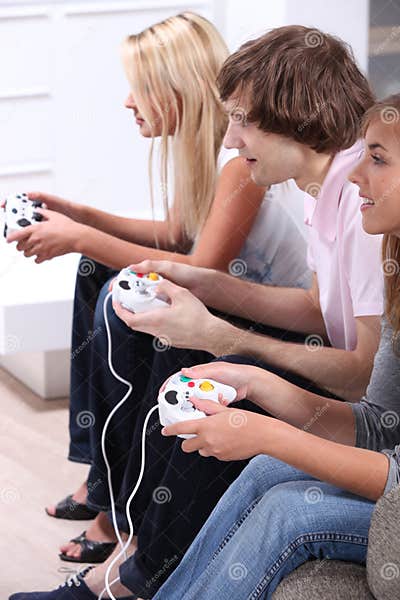 Teenagers Playing Computer Games Stock Photo - Image of close ...