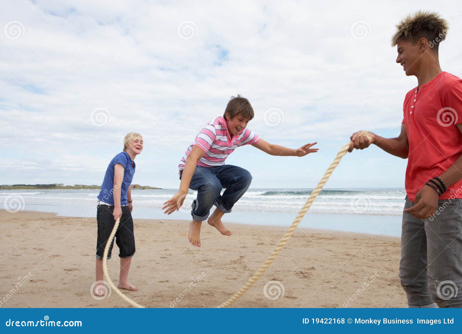 Teenagers Playing Skipping Rope Stock Photo - Image of enjoying, people ...