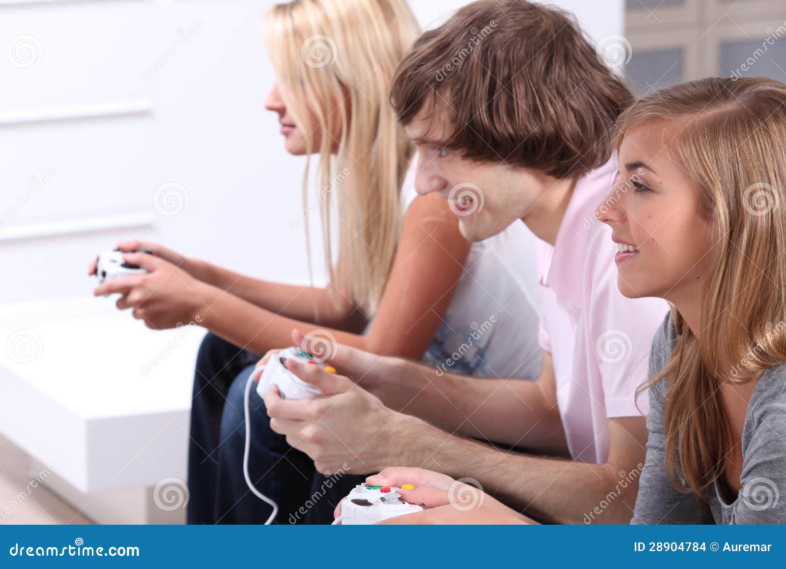 Teenagers Playing Video Games Stock Photo - Image of livingroom ...