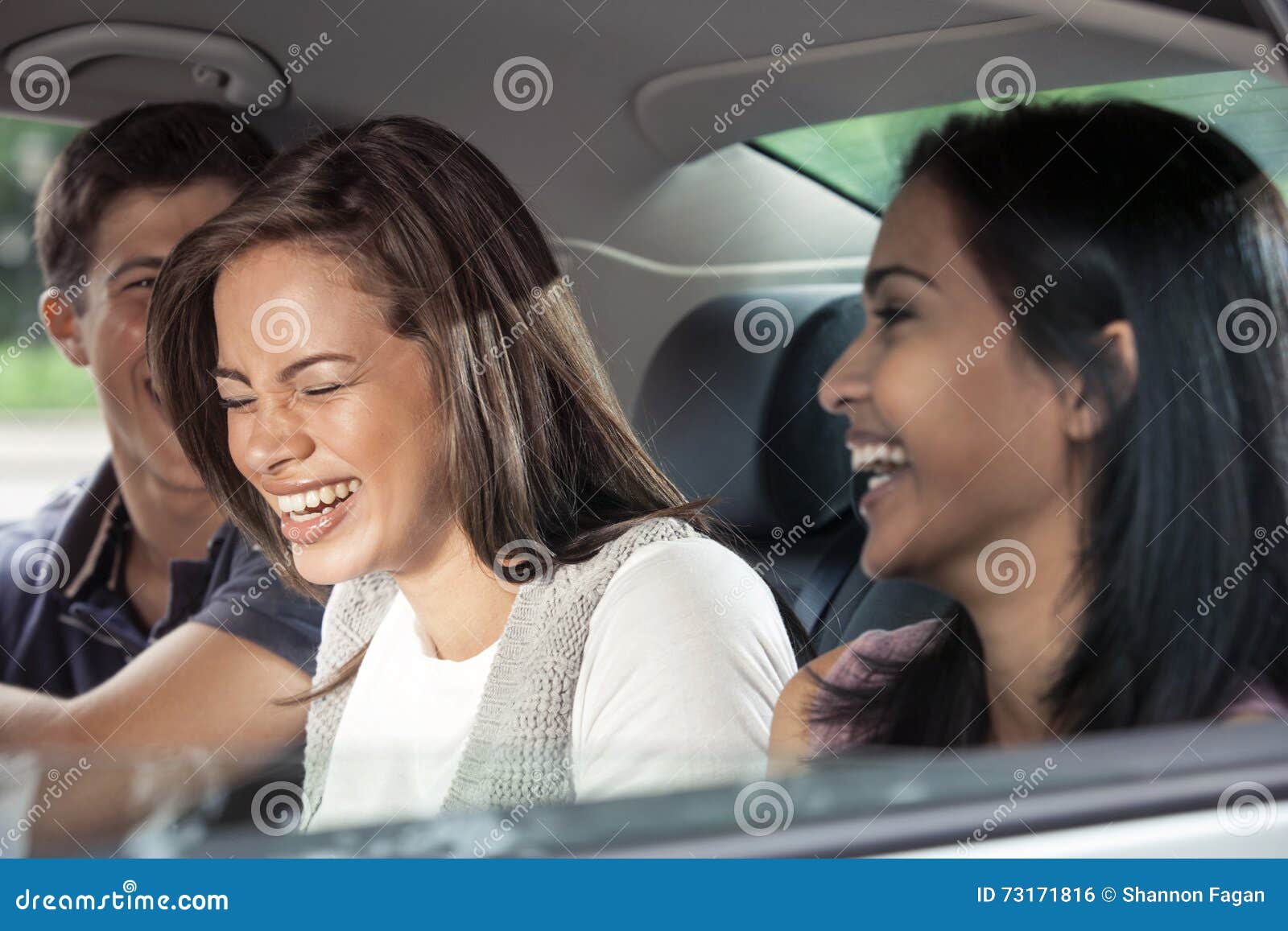 Teenagers riding in car stock photo. Image of optimistic - 73171816