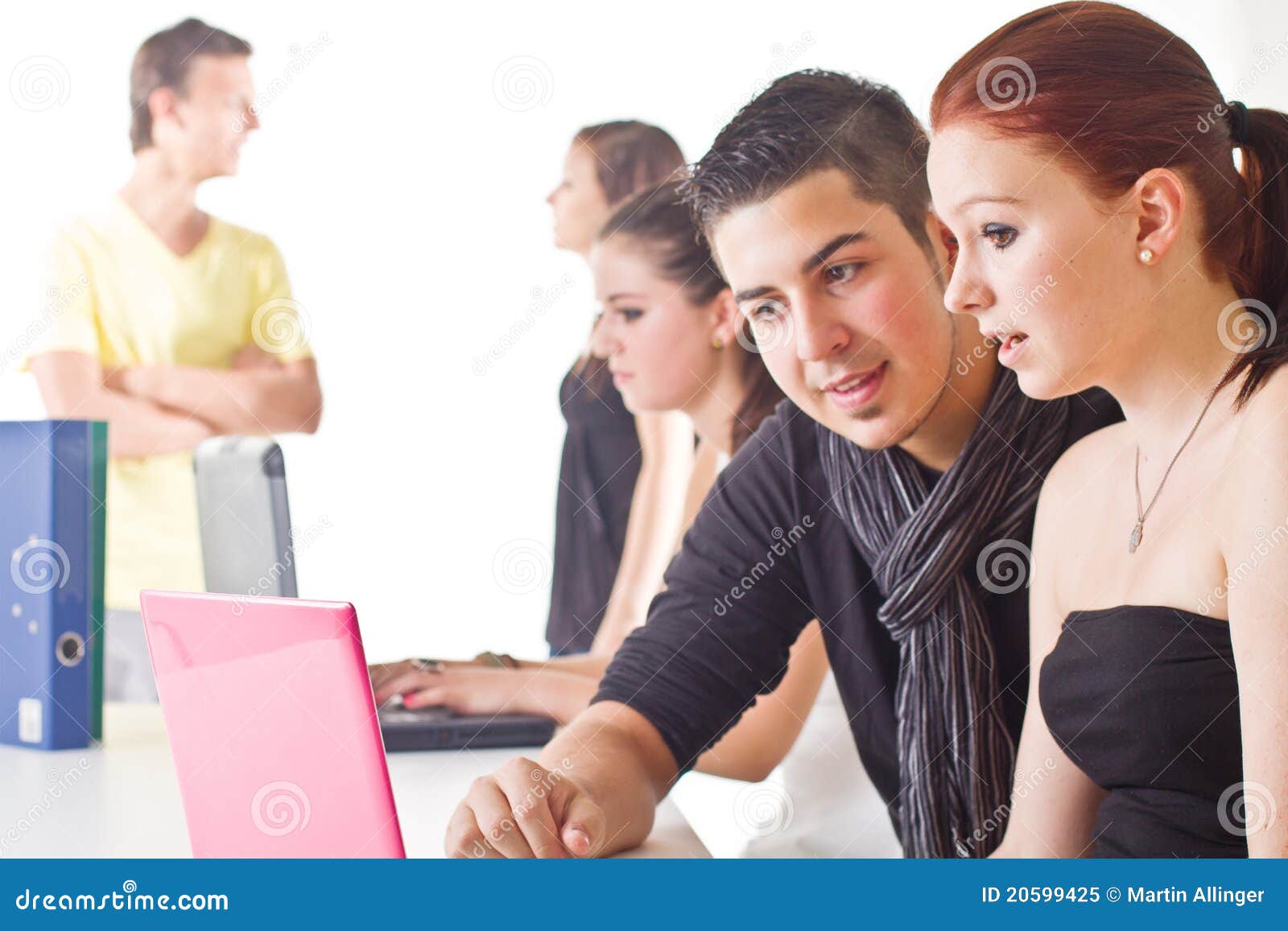 Teenagers surfing the web stock image. Image of group - 20599425
