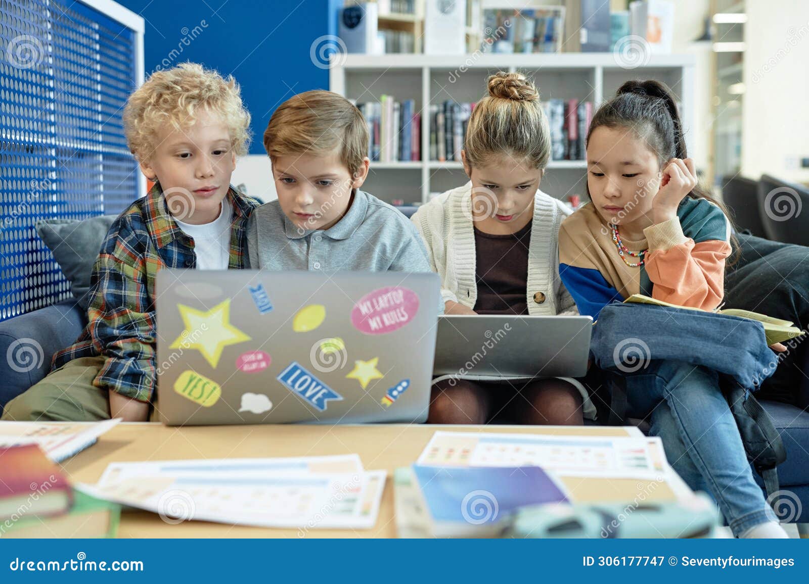 Teenagers Using Computers in Break in Library Stock Image - Image of ...