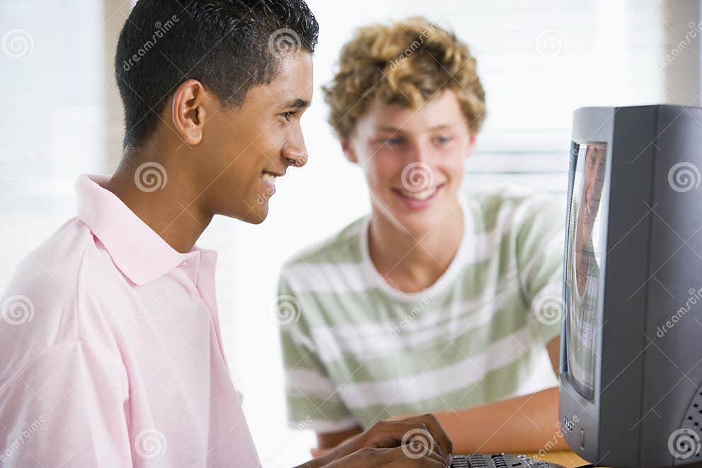 Teenagers Using Desktop Computer Together Stock Photo - Image of ...