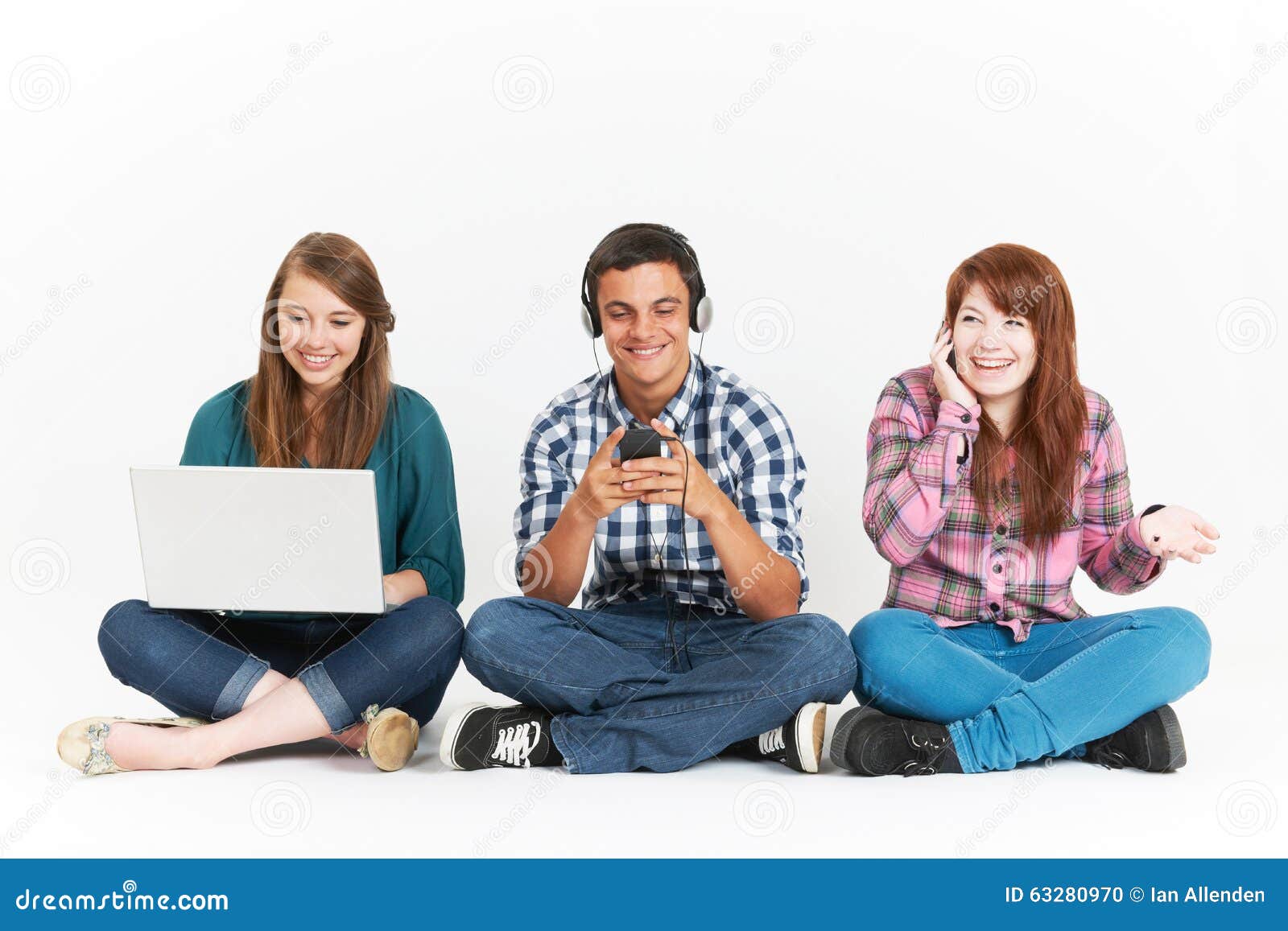 Teenagers Using Different Forms of Digital Technology in Studio Stock ...