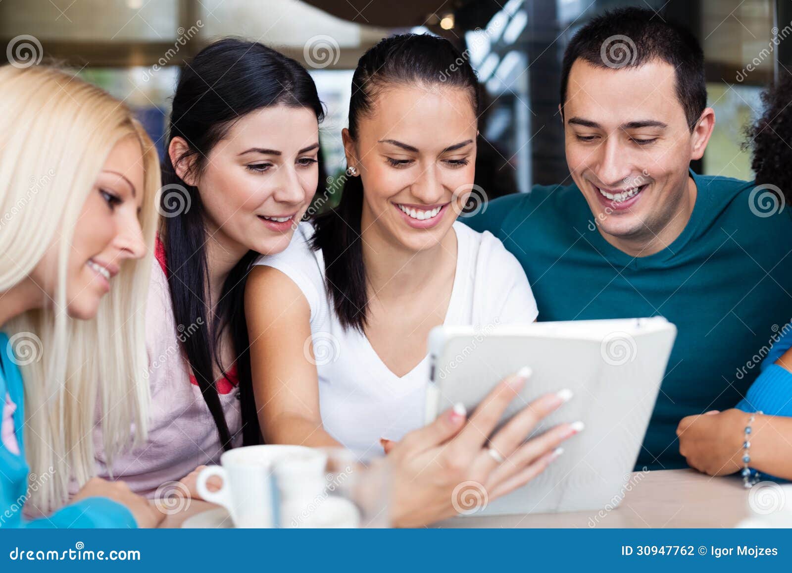 Teenagers Using Digital Tablet Stock Photo - Image of students, people ...