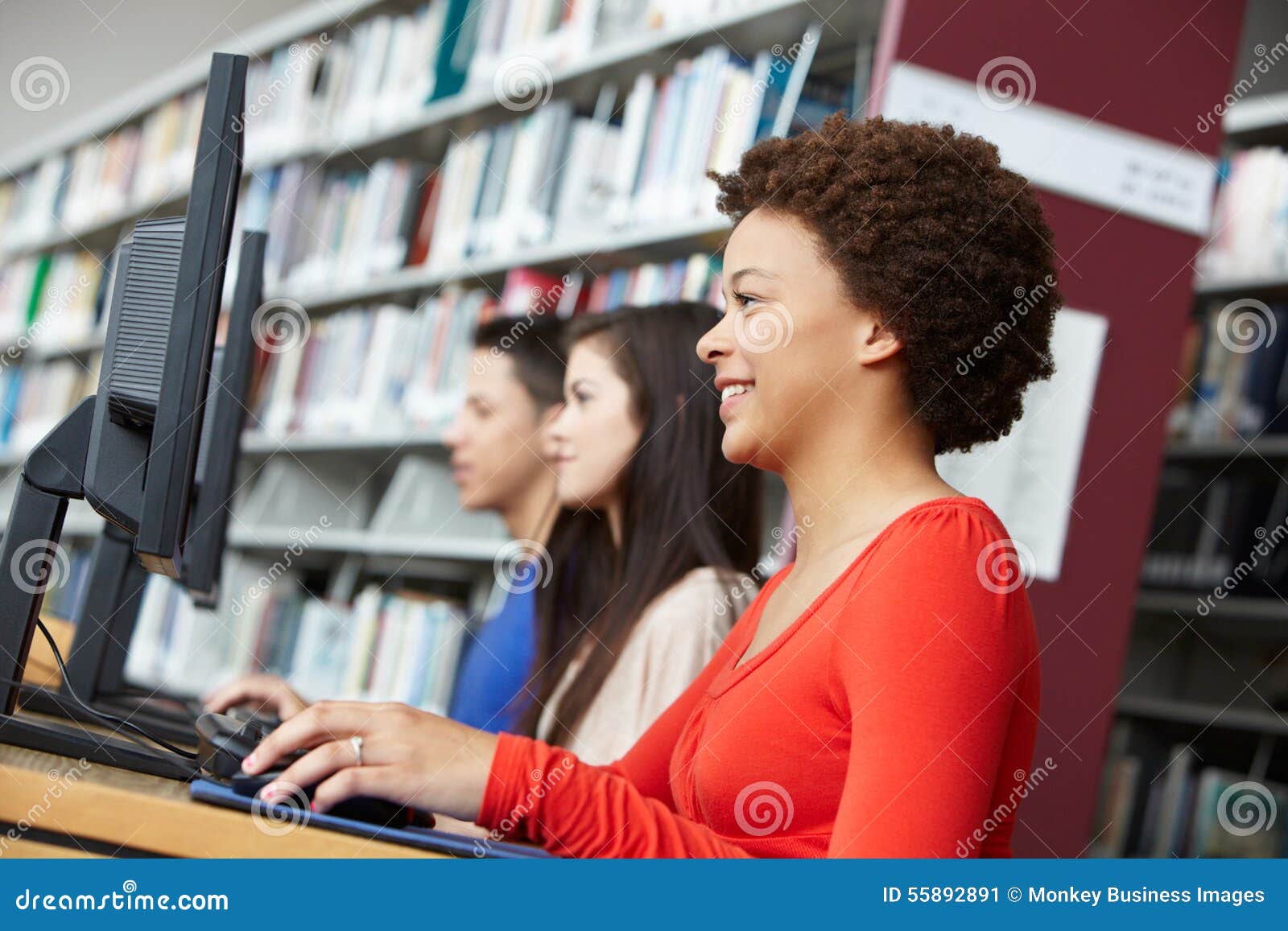 Teenagers Working on Computers in Library Stock Image - Image of group ...