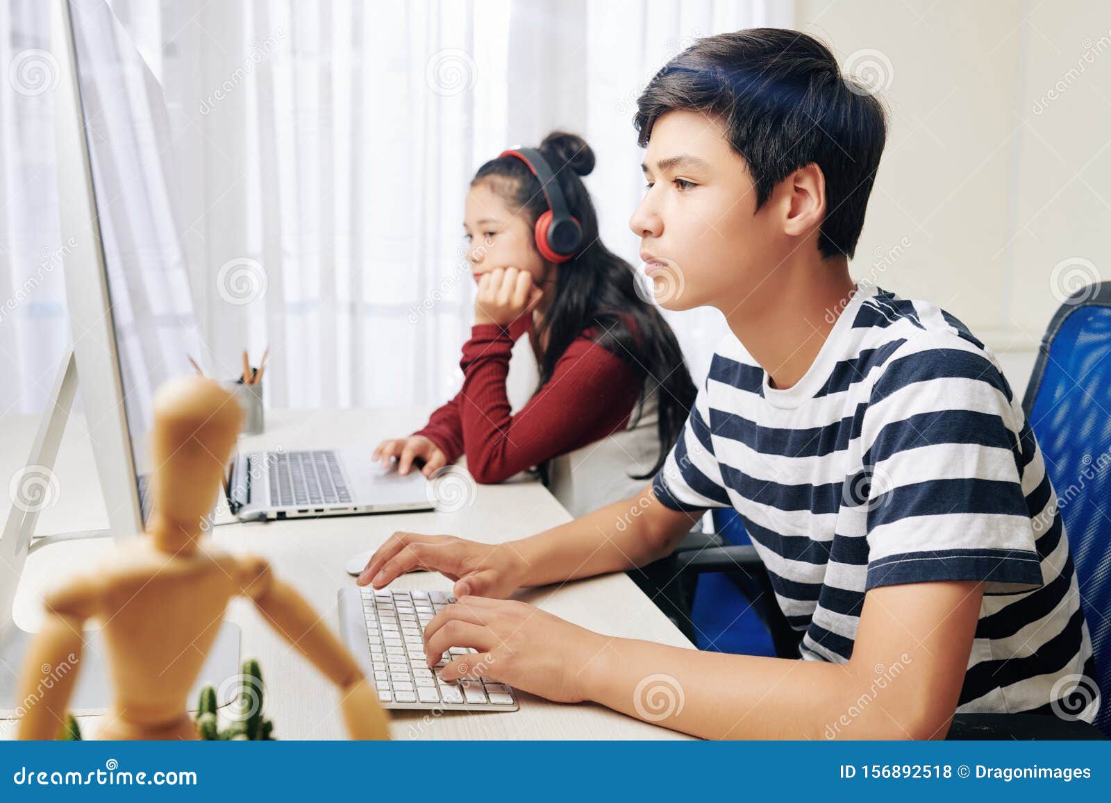 Teenagers Working on Computers Stock Photo - Image of smiling, laptop ...