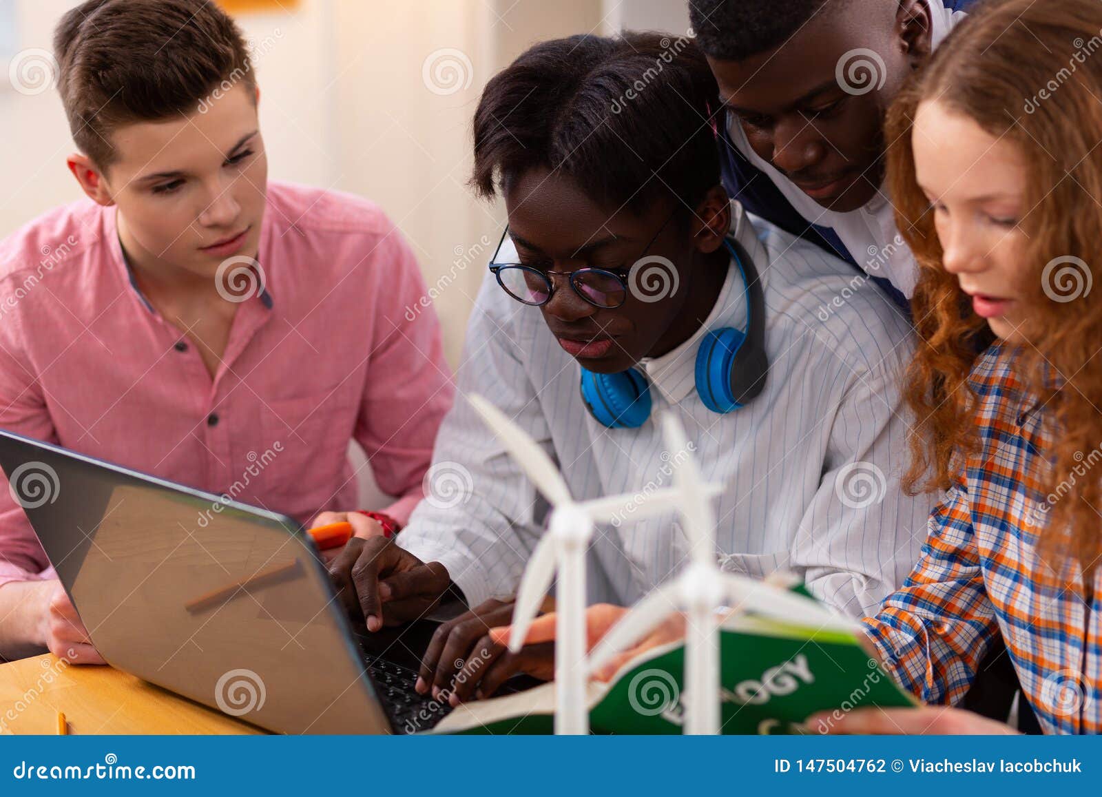 Teenagers Working on Final Project in Ecology and Energy Sources Stock ...