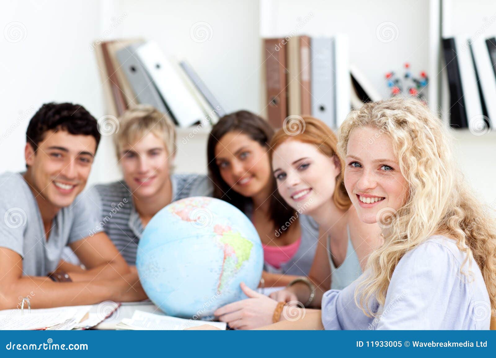 Teenagers Working with a Terrestrial Globe Stock Image - Image of ...