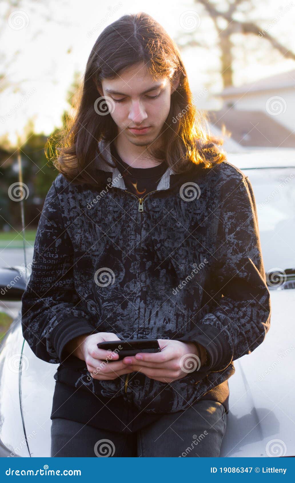 Teenboy Texting stock image. Image of phone, long, outside - 19086347