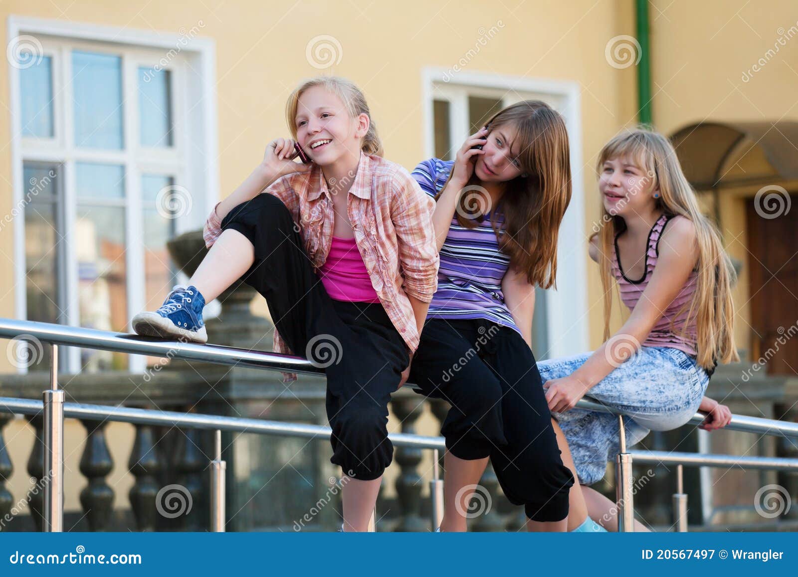 Group of Teen Girls Calling on the Mobile Phones Stock Image - Image of ...