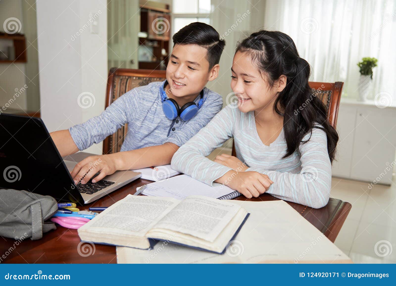 Teens doing homework stock image. Image of children - 124920171