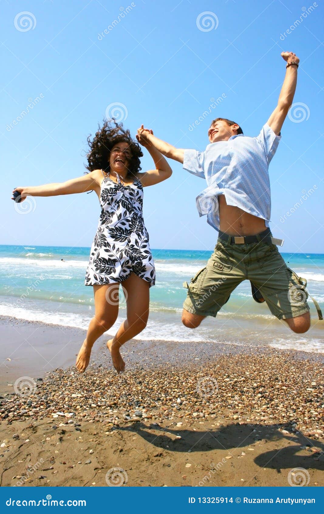 Teens jumping stock photo. Image of holiday, girl, cute - 13325914