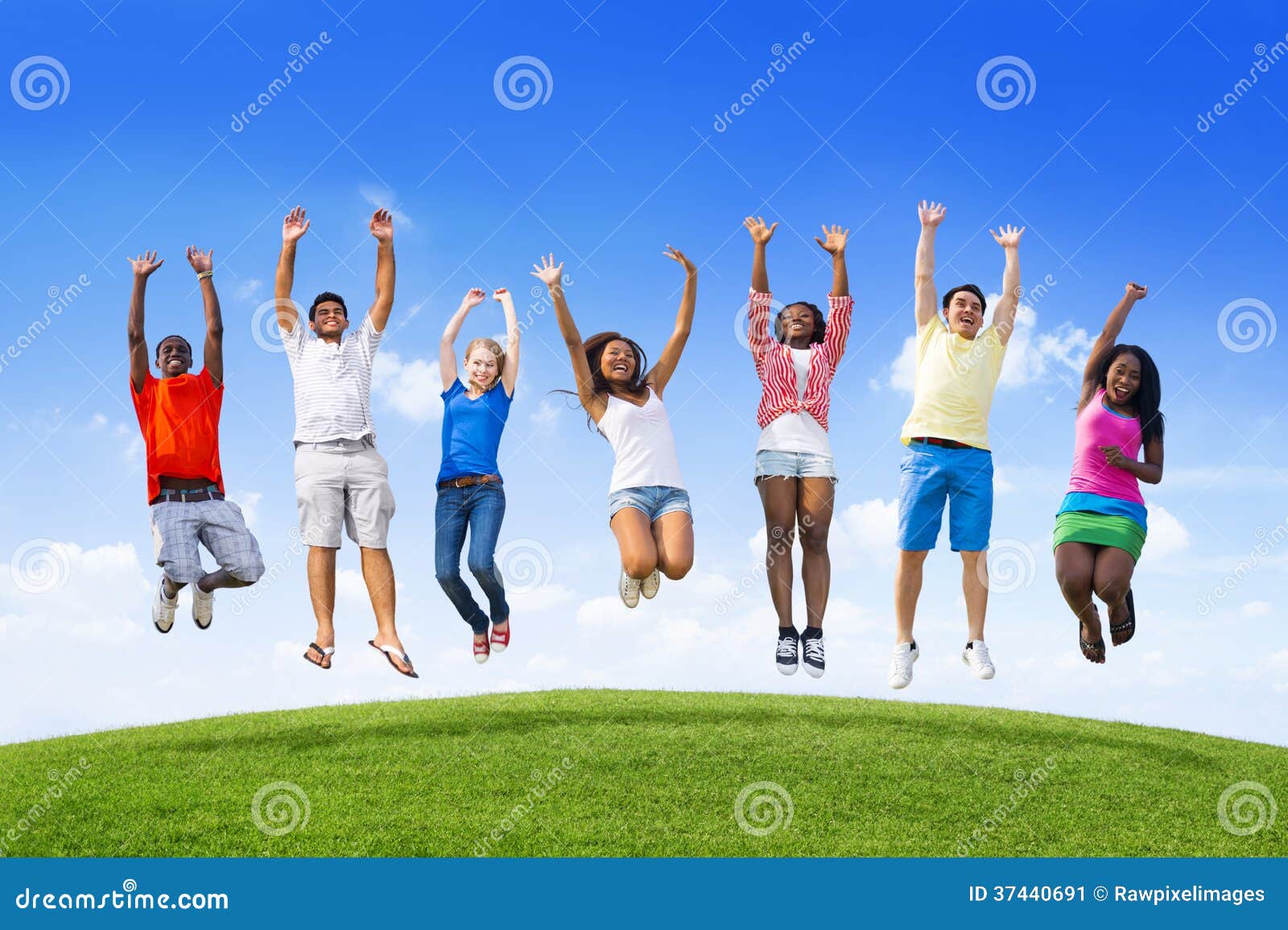 Teens Jumping on a Hill stock image. Image of happiness - 37440691