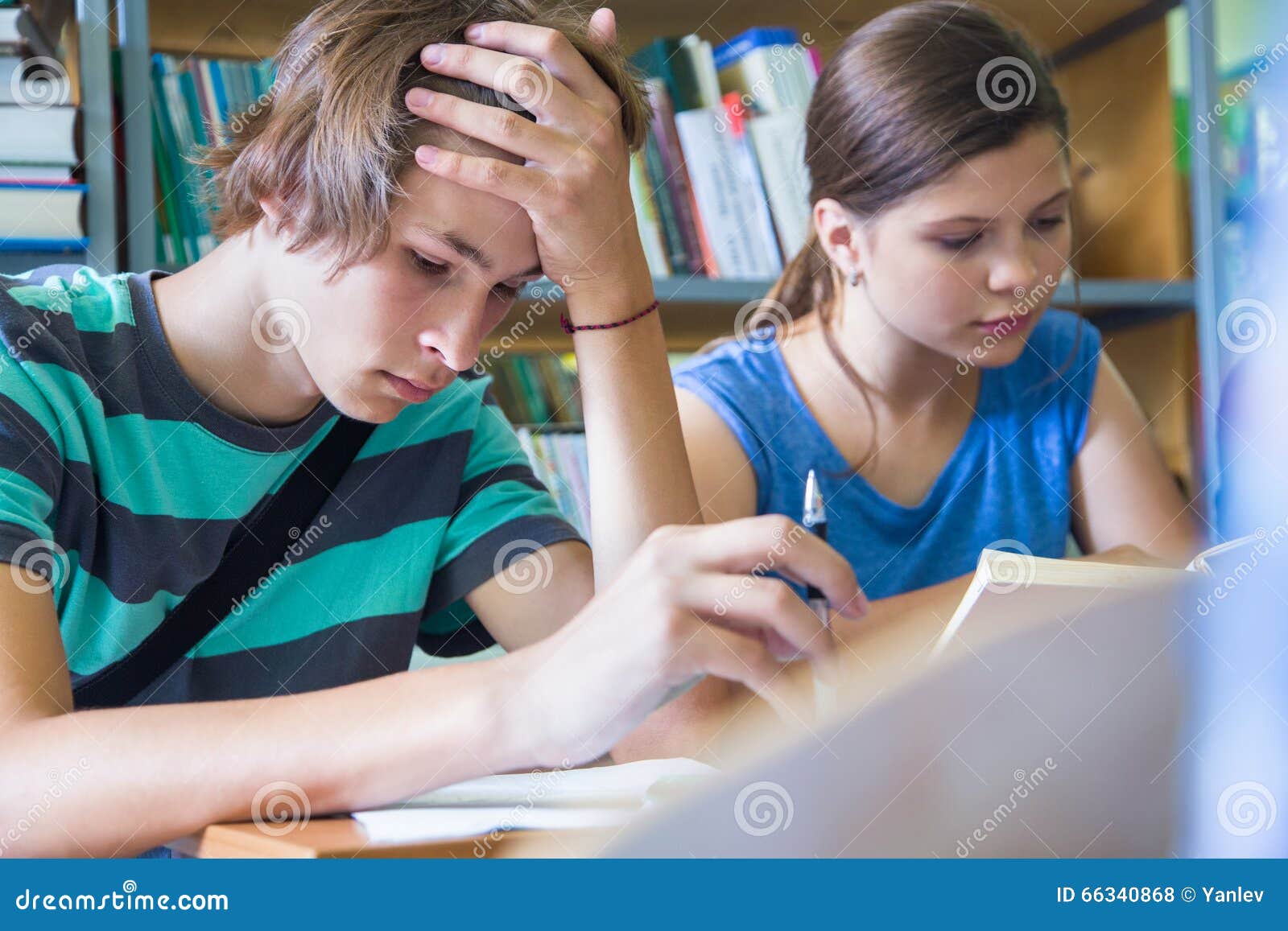 Teens in library stock photo. Image of group, classroom - 66340868