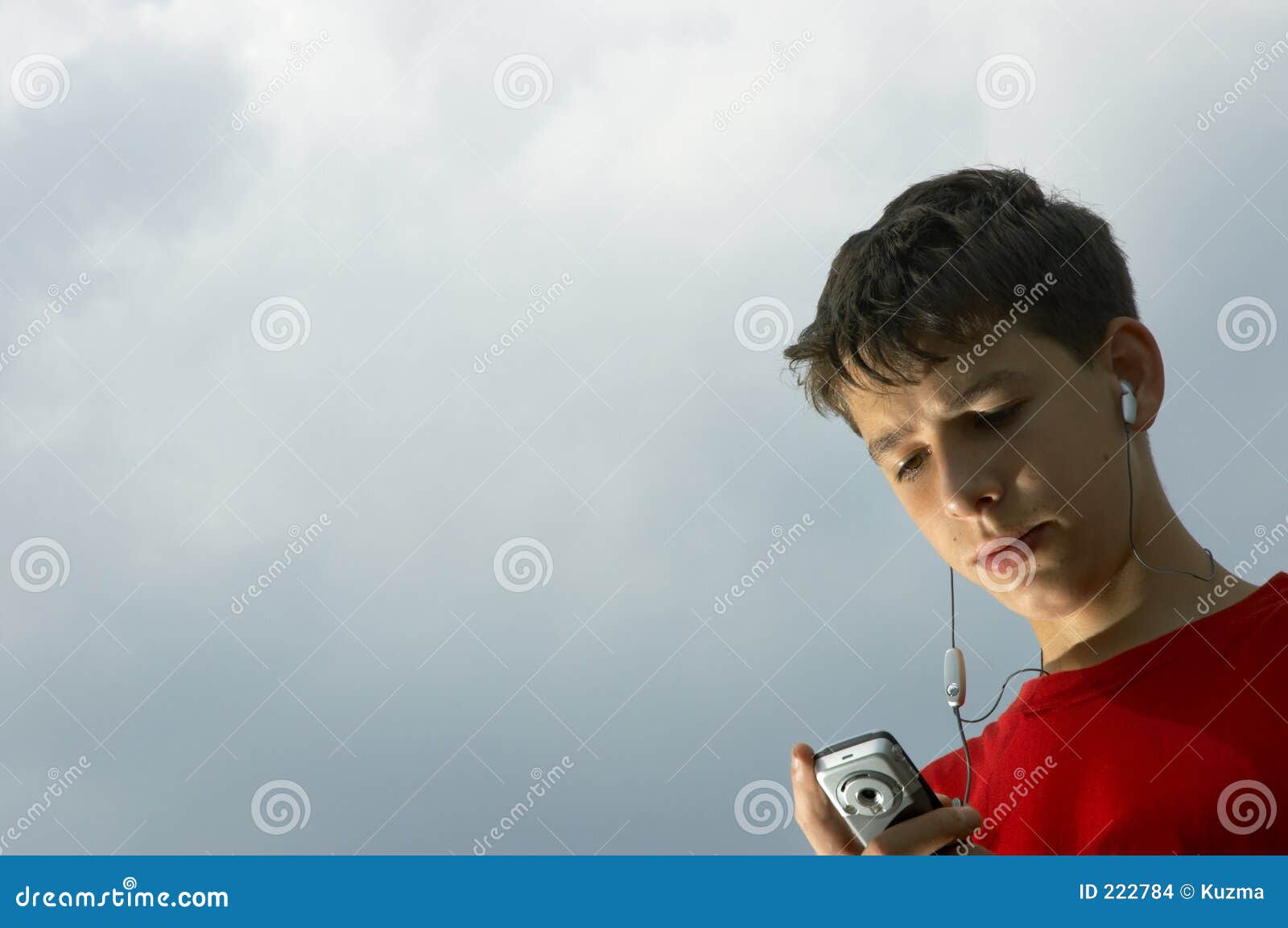 Teens listen to mp3 player stock photo. Image of style - 222784