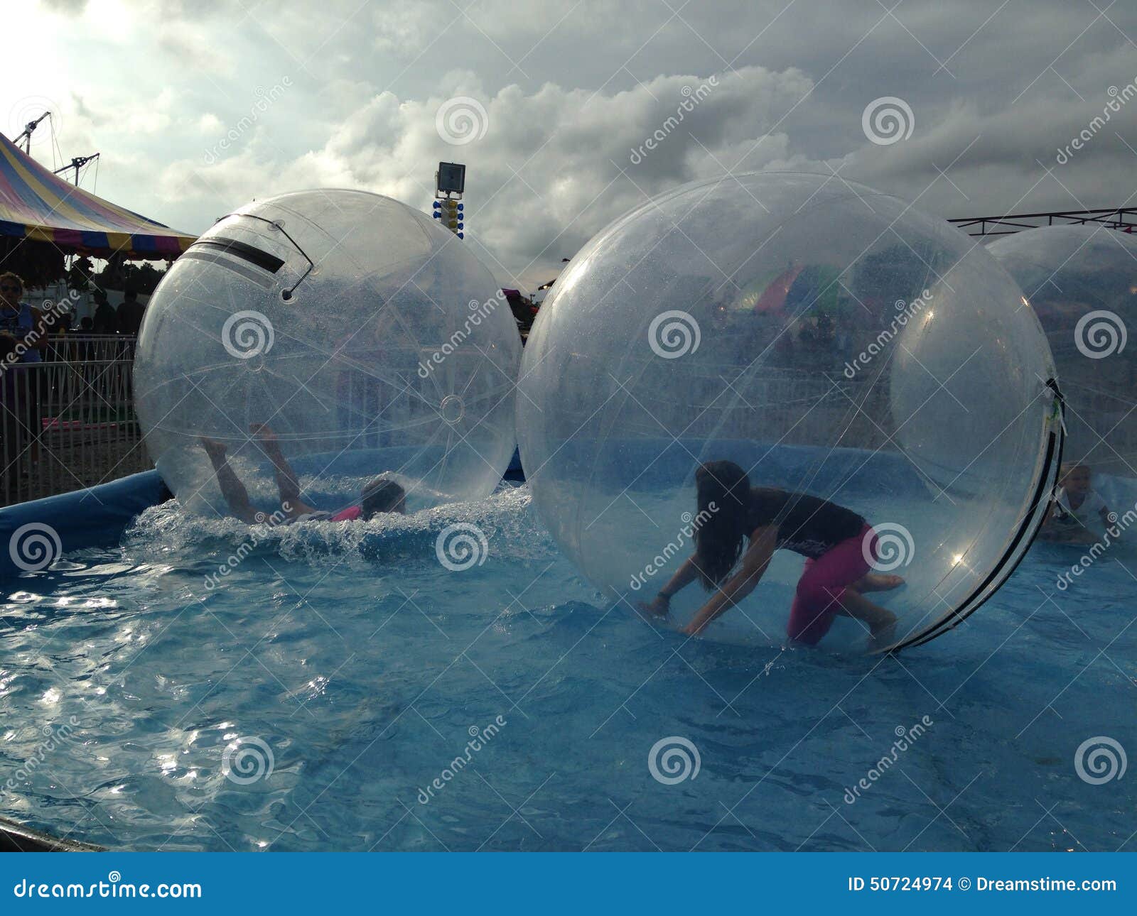 Teens Playing in Water Balls Editorial Stock Image - Image of water ...