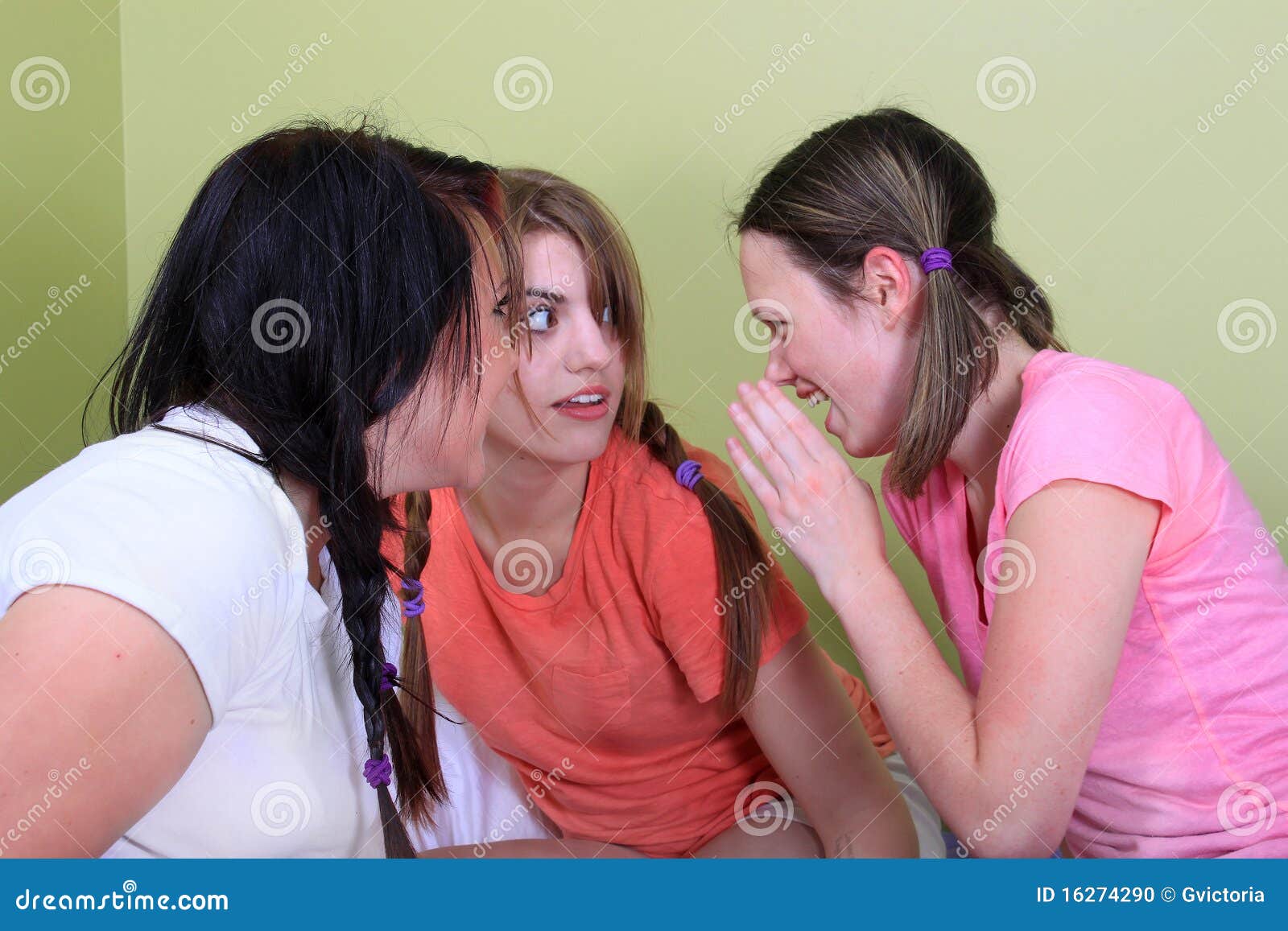 Teens telling secrets stock photo. Image of gossiping - 16274290