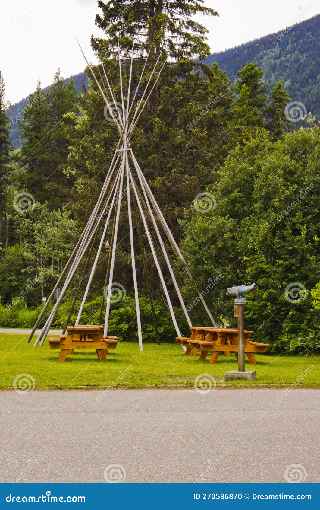 Teepee Poles and Picnic Tables Stock Photo - Image of frame, display ...