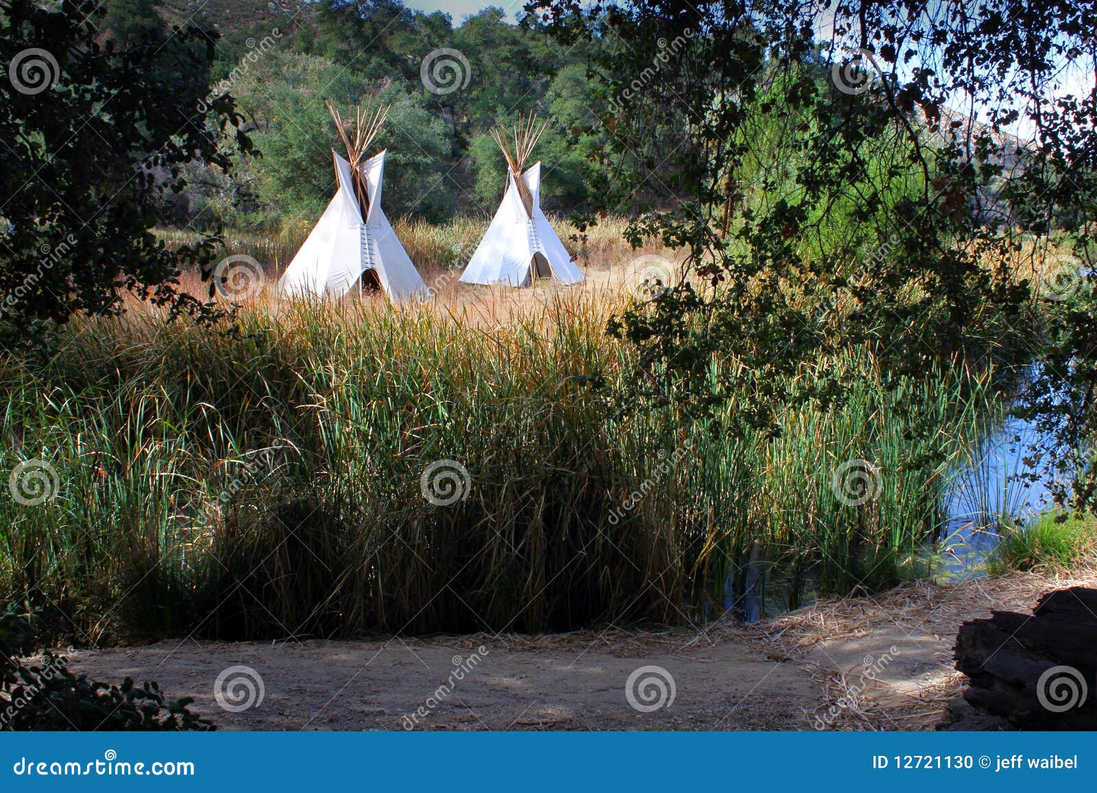 Teepees in Western setting stock photo. Image of chippewa - 12721130