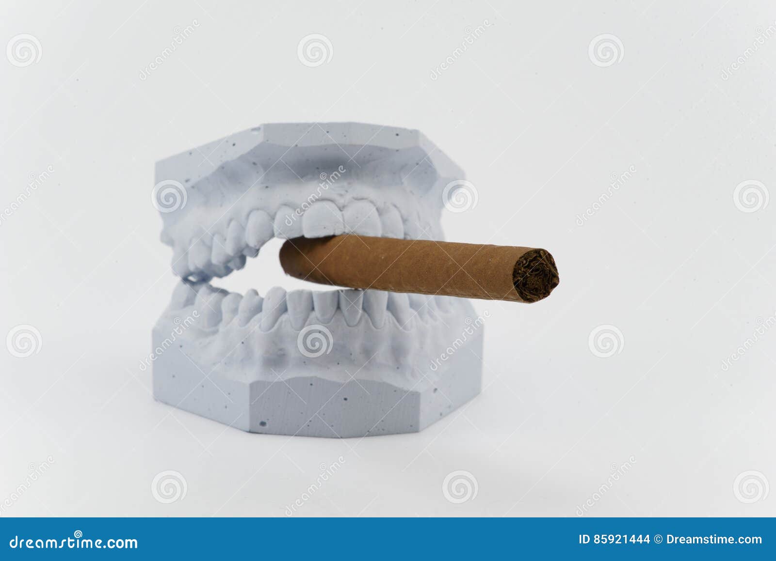 Teeth and cigar stock photo. Image of white, cigarettes - 85921444