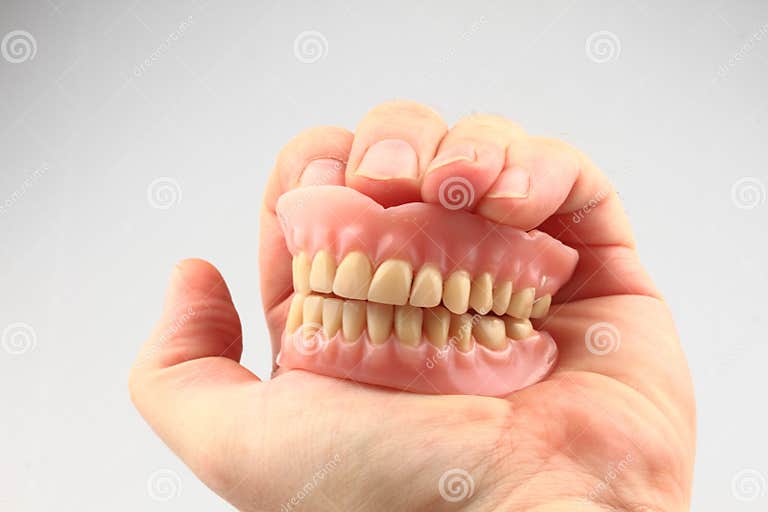 Teeth Prosthesis in the Human Hand Stock Image - Image of prosthesis ...