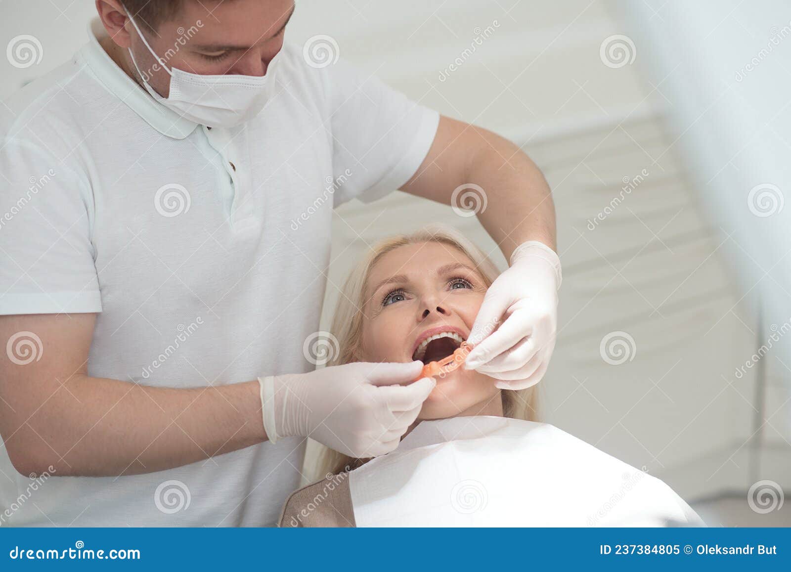 Dental Surgeon Making Teeth Replacement Procedure Stock Image - Image ...