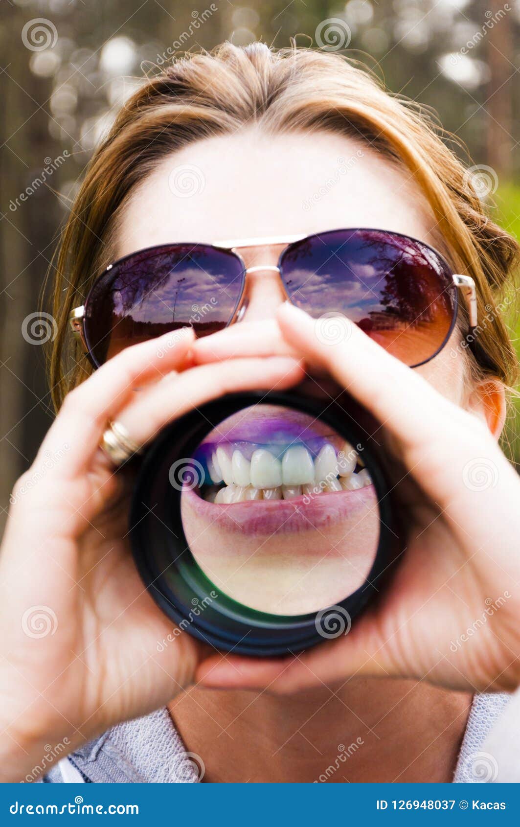 Showing Teeth Smile through Magnifying Lens Stock Image - Image of ...