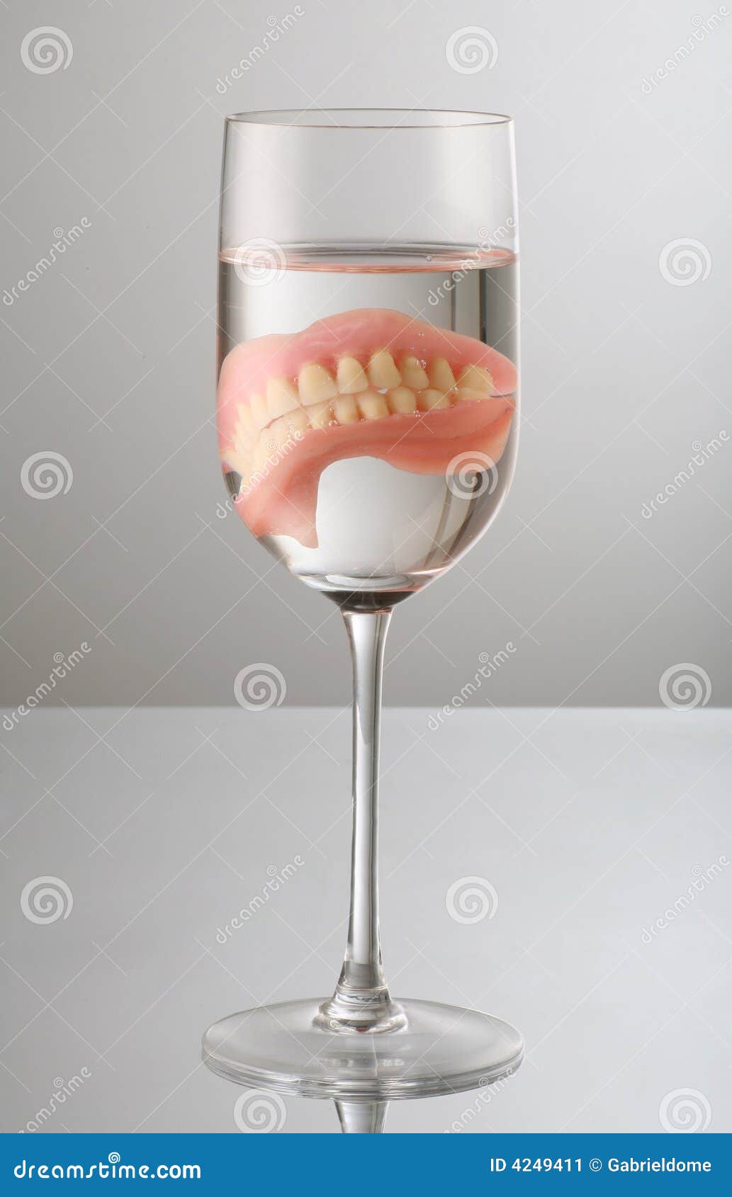 Teeth on Wine glass stock image. Image of dentures, biting - 4249411