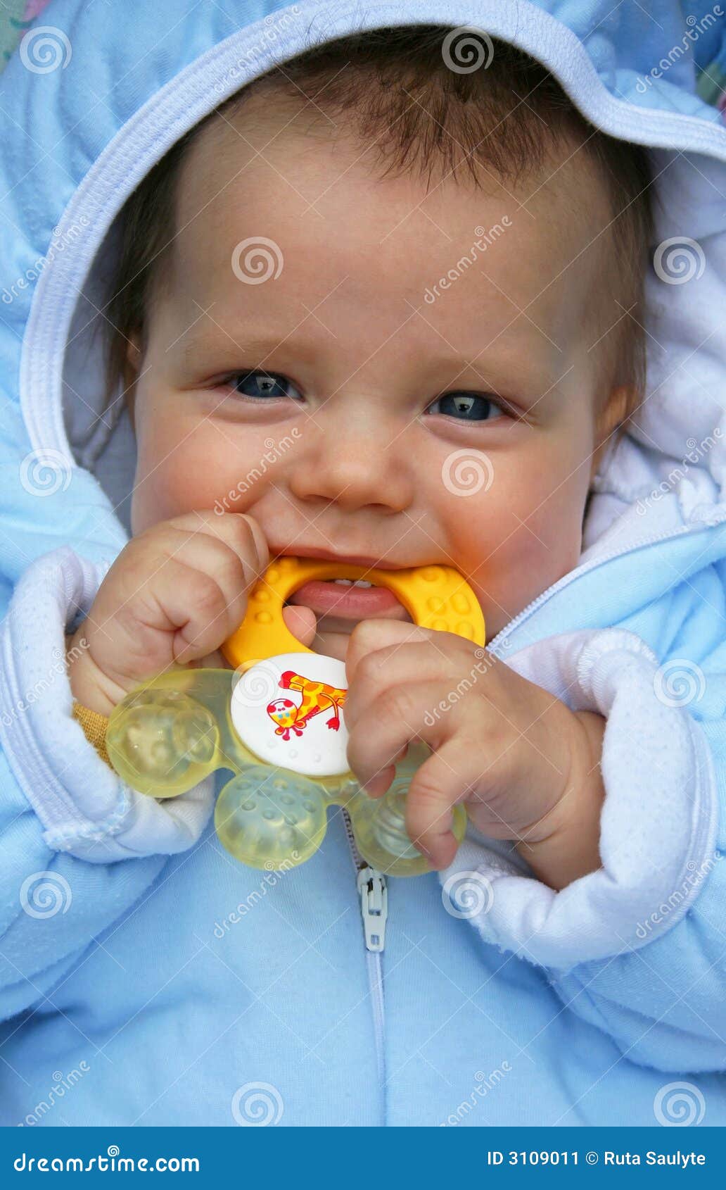 Teething baby stock image. Image of chewing, blue, childcare - 3109011