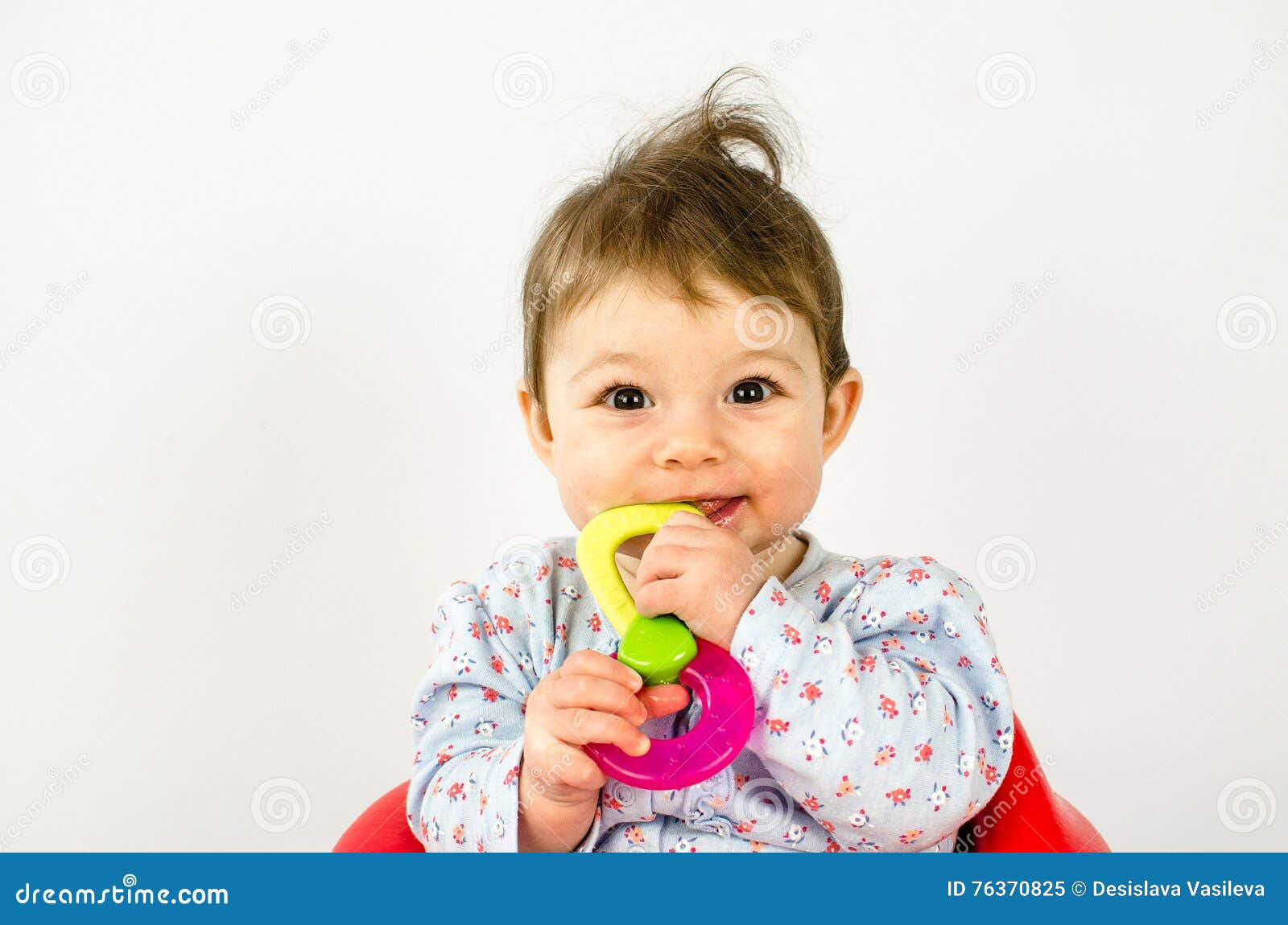 Teething baby girl stock image. Image of girl, pijamas - 76370825