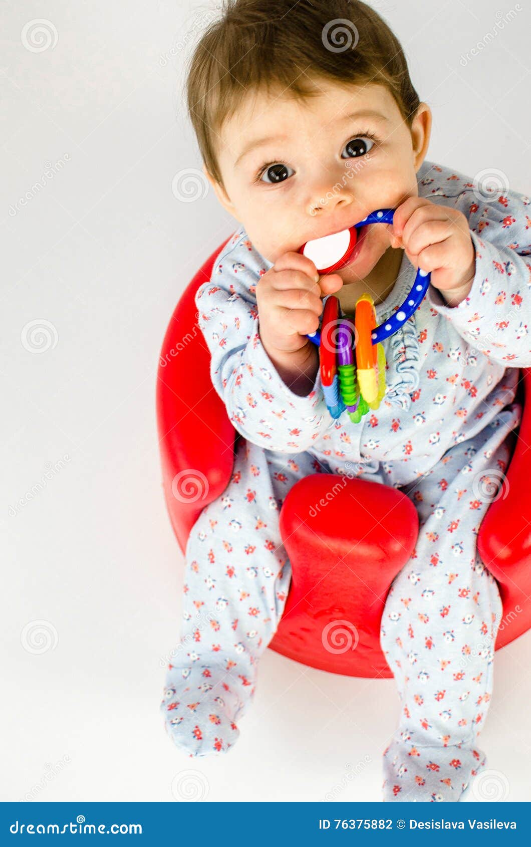 Teething baby girl stock photo. Image of teeth, plastic - 76375882