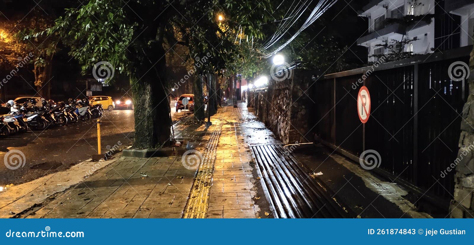 Teh street at night stock image. Image of evening, tree - 261874843