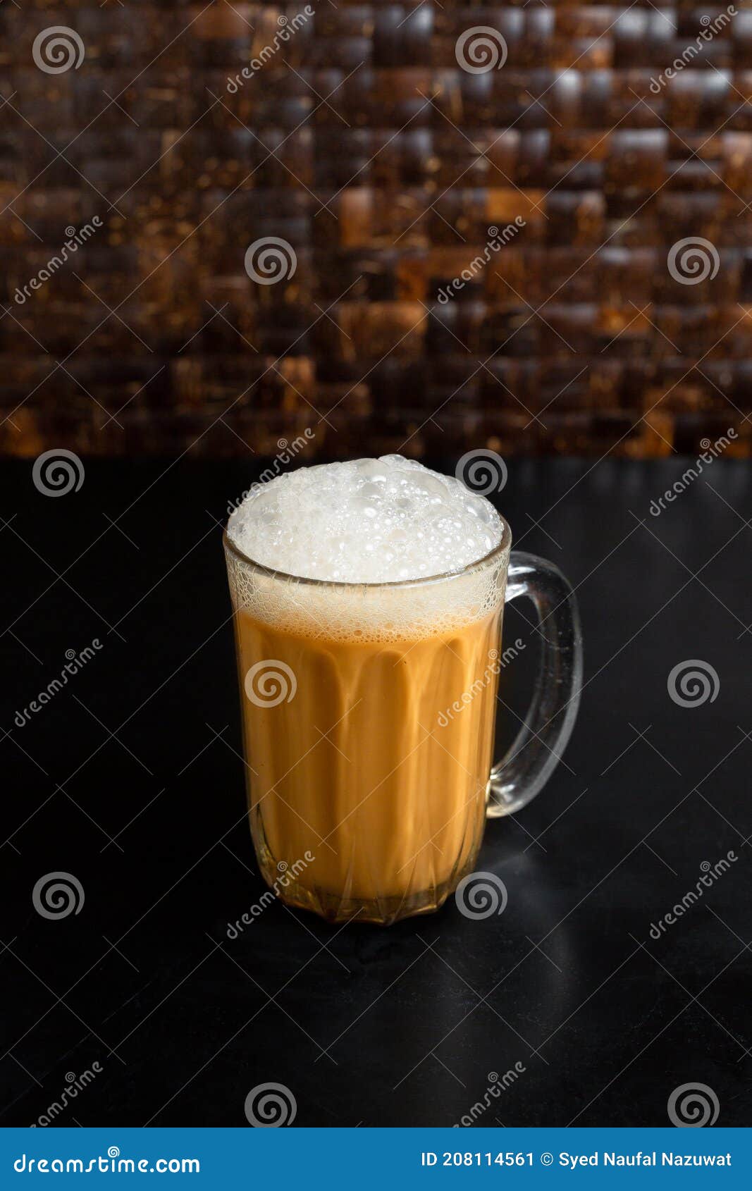 Teh Tarik Or Pulled Tea Is A Famous Sweet Milk Tea In Malaysia Stock ...