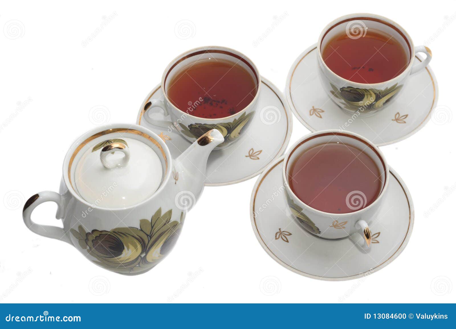 Teiera e tre tazze fotografia stock. Immagine di britannico - 13084600