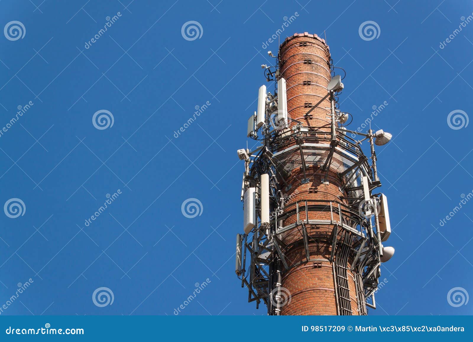 Telecommunication Antennas on an Old Brick Chimney. Industrial Concept ...