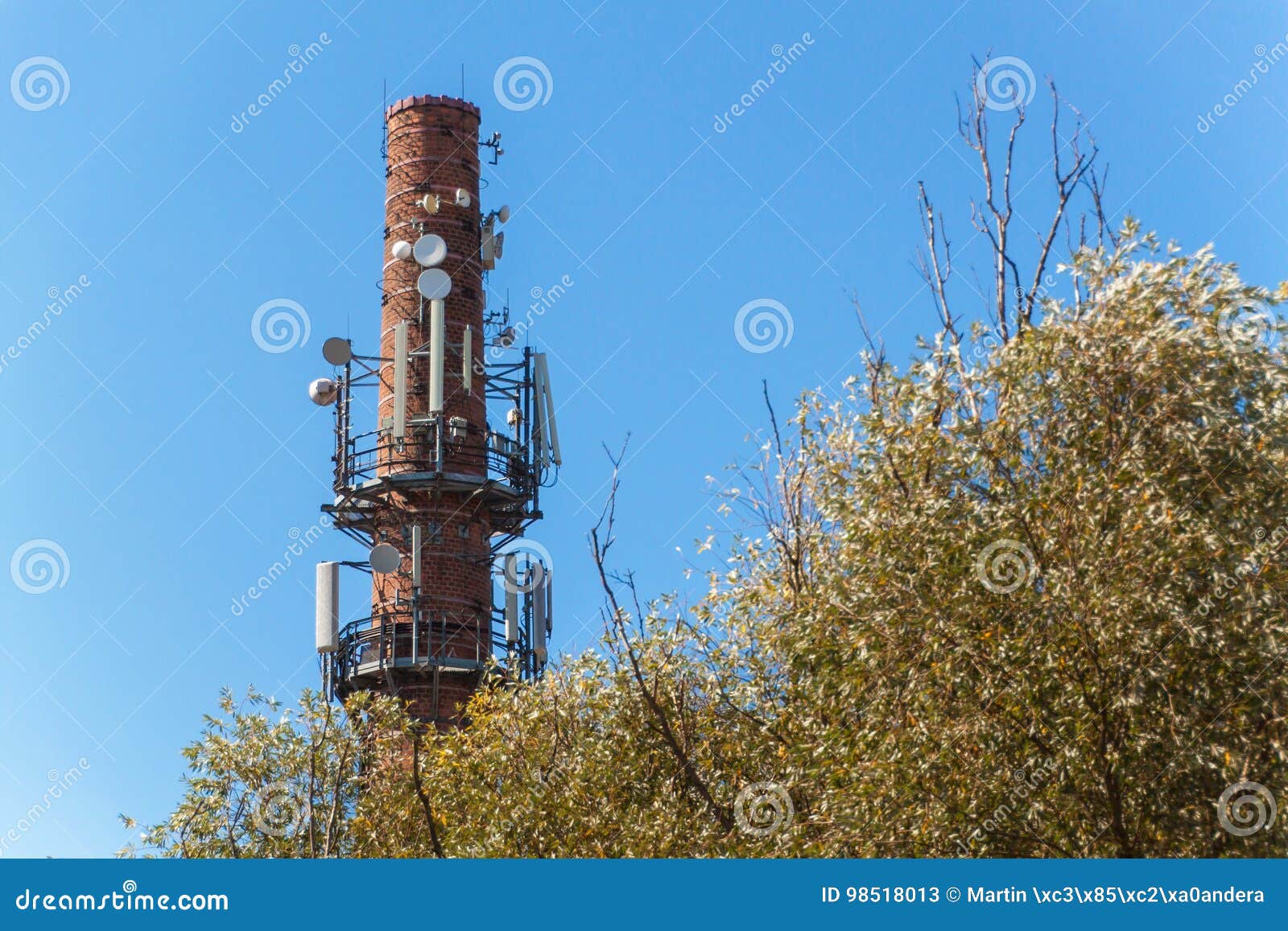 Telecommunication Antennas on an Old Brick Chimney. Industrial Concept ...