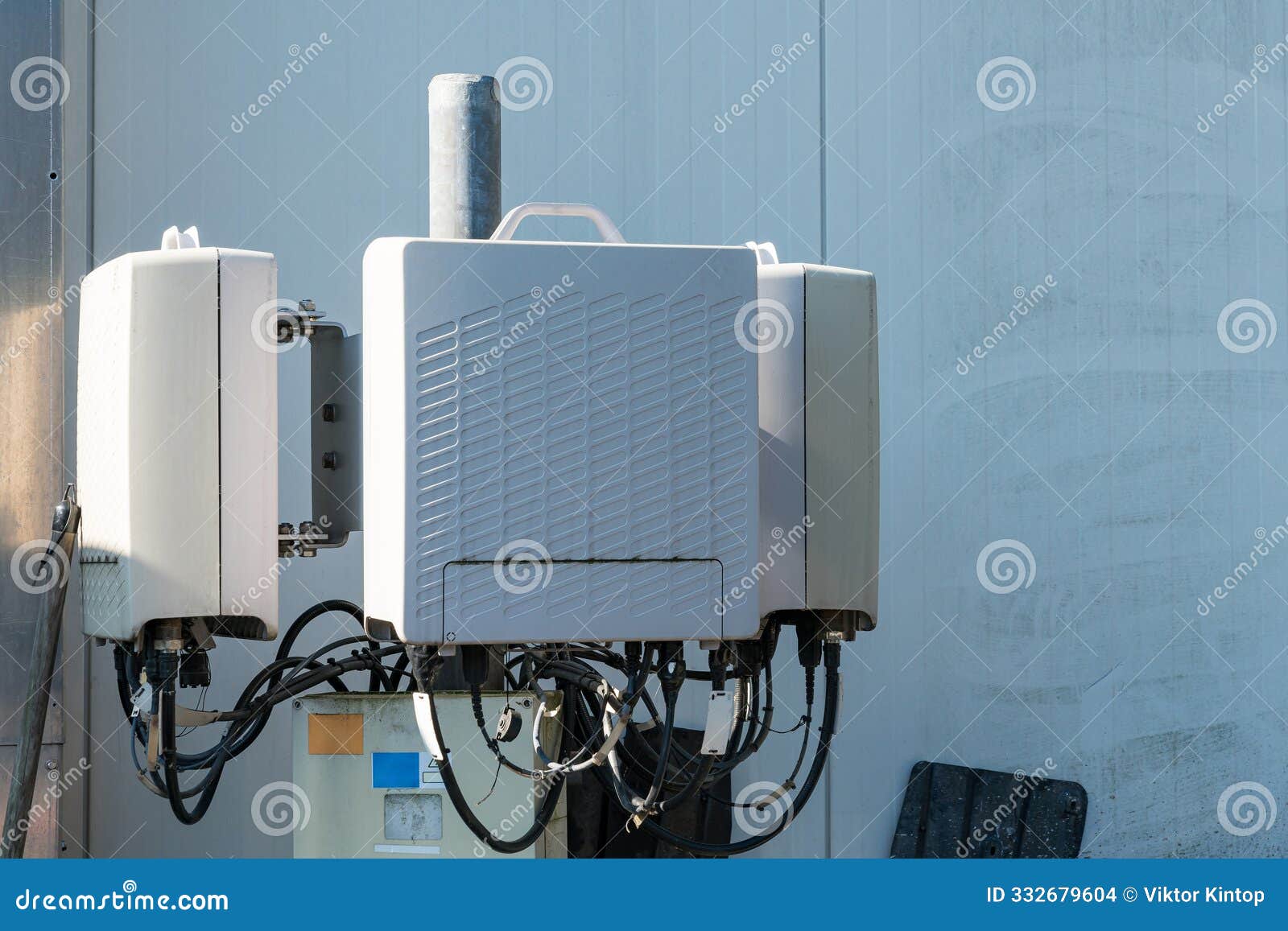 Telecommunication Equipment Mounted on a Black Wall at an Industrial ...